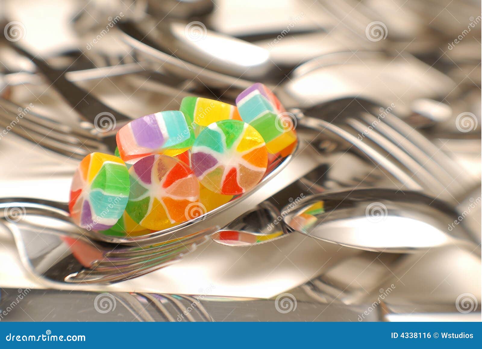 Candy on a Spoon stock photo. Image of color, butter, forks - 4338116