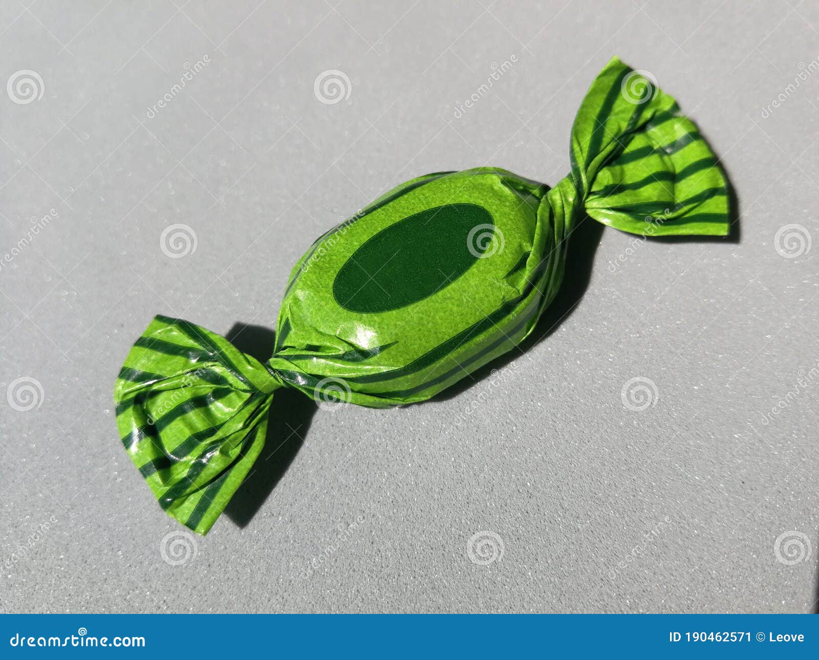 Candy Wrapped in a Package Which is Printed in Two Shades of Green ...