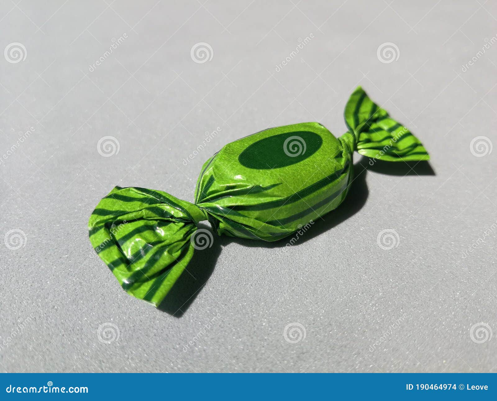 Candy Wrapped in a Plastic Package Which is Printed in Two Shades of ...
