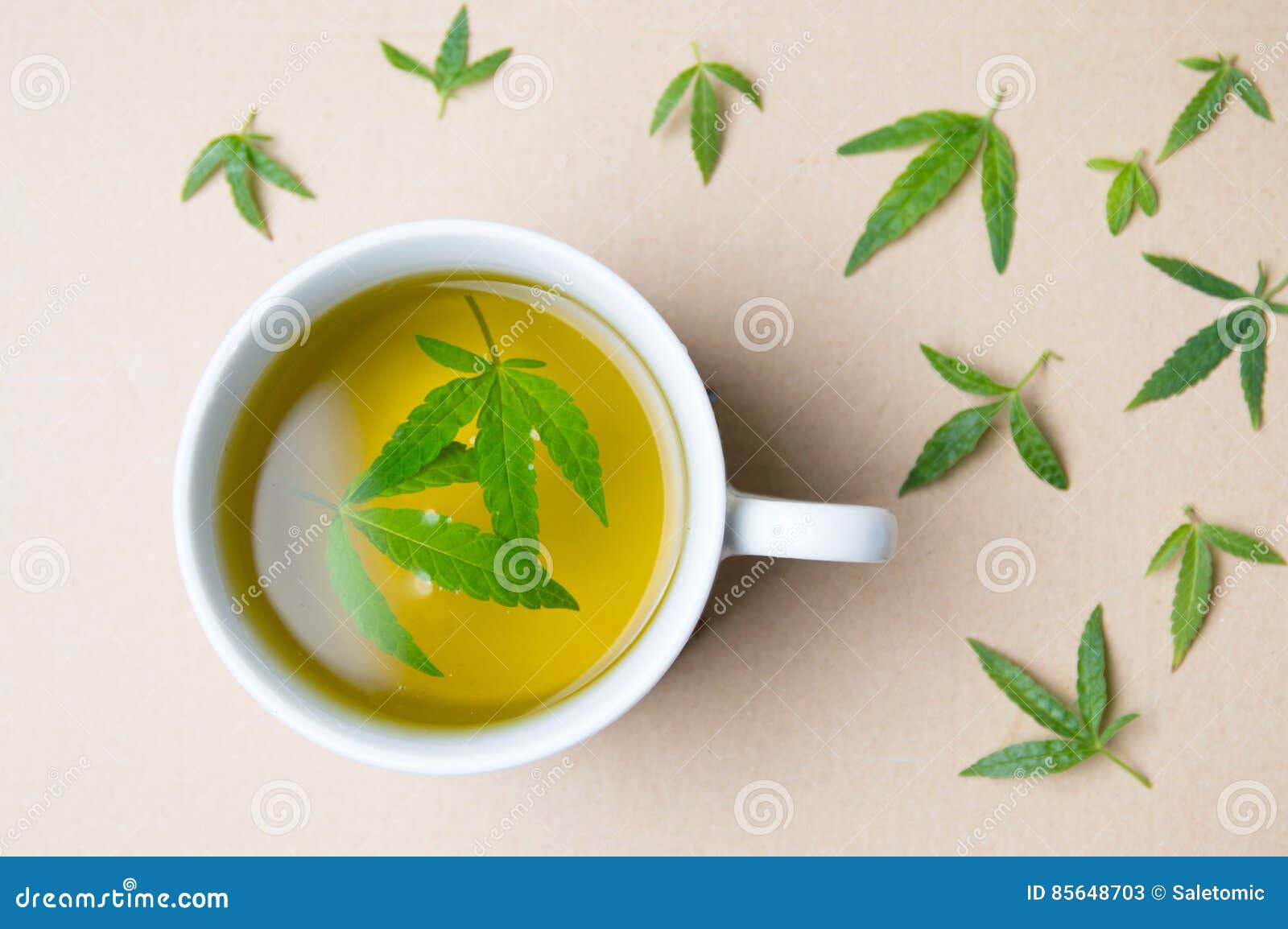 Cannabis Herbal Tea and Marijuana Leaves Stock Image - Image of teacup ...