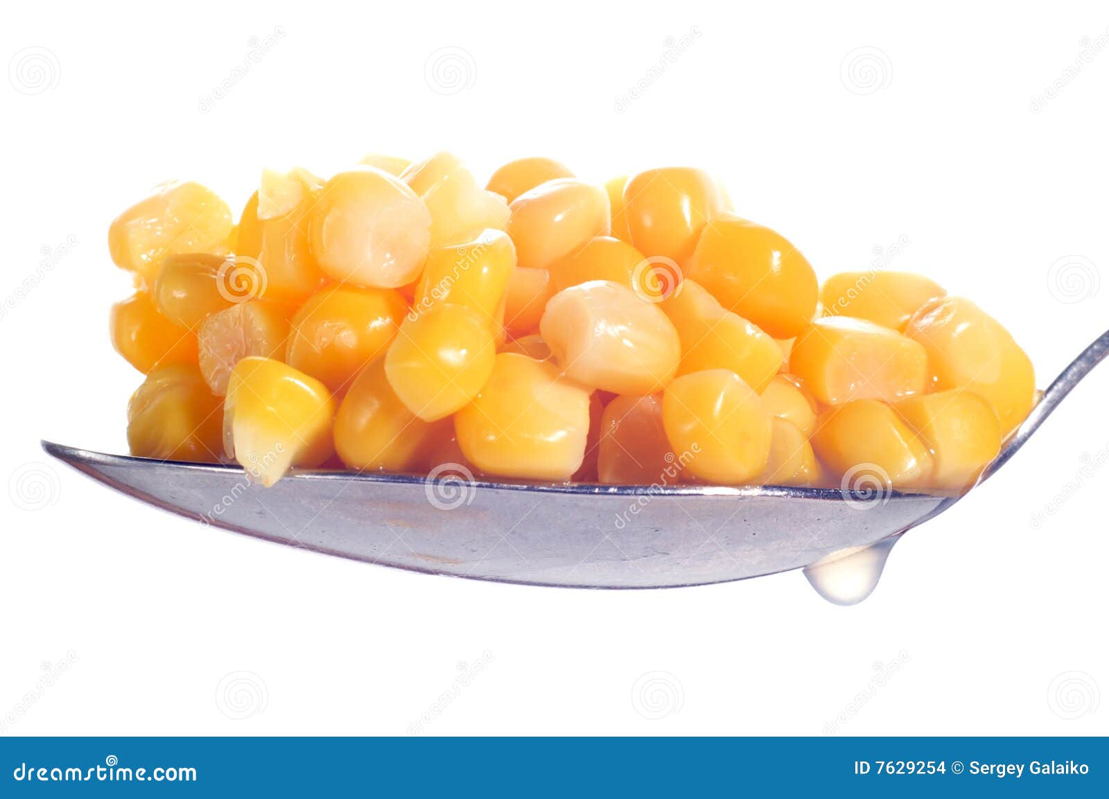 Canned corn in spoon stock photo. Image of healthy, vegetable - 7629254