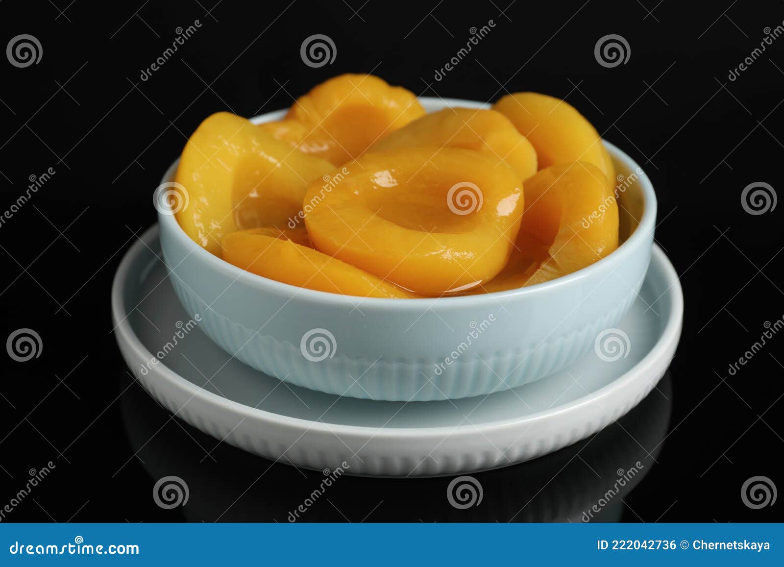 Canned Peach Halves in Bowl on Black Background Stock Photo - Image of ...