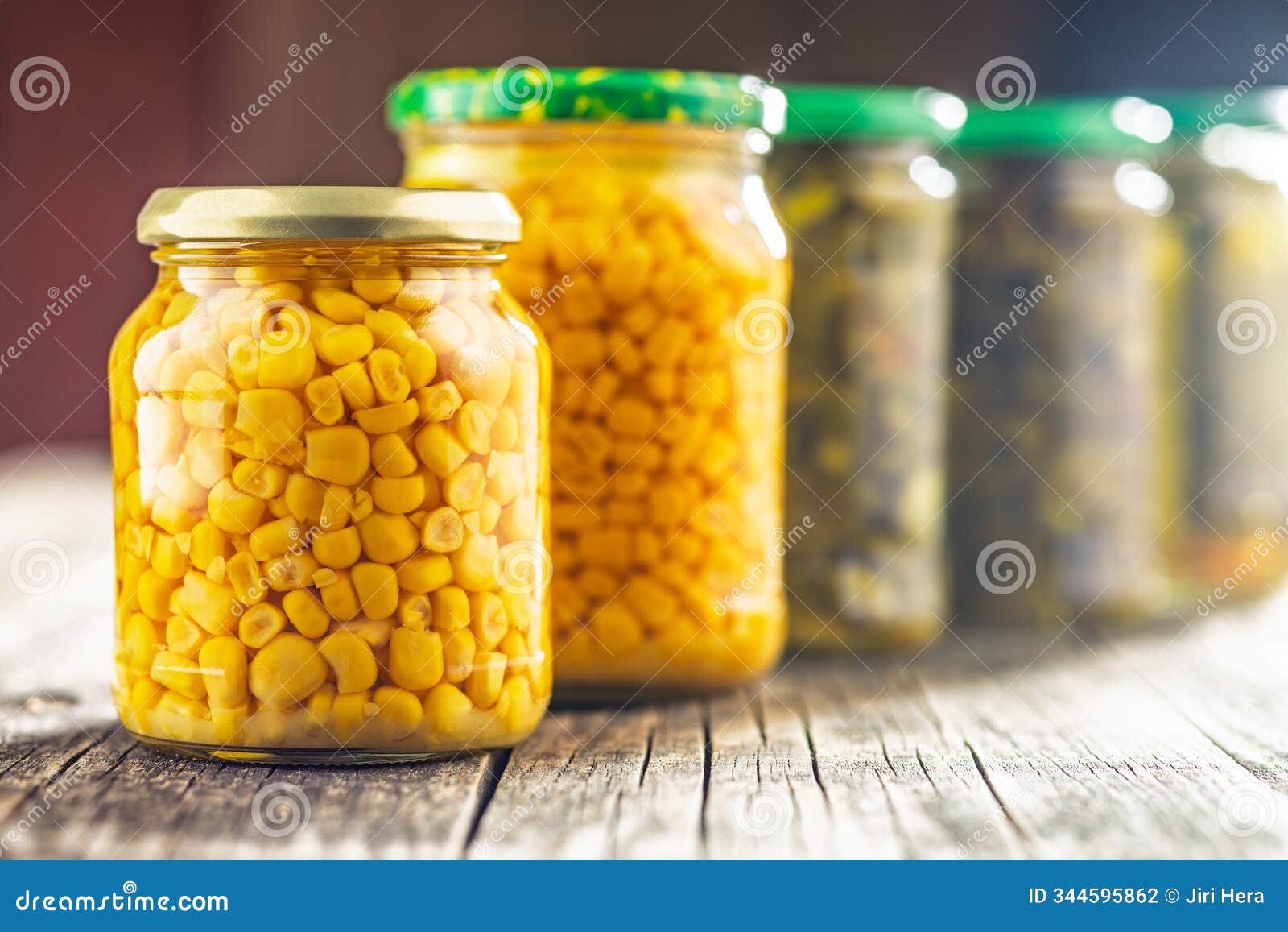 Canned Sweet Corn in Jar on Wooden Table Stock Photo - Image of ...