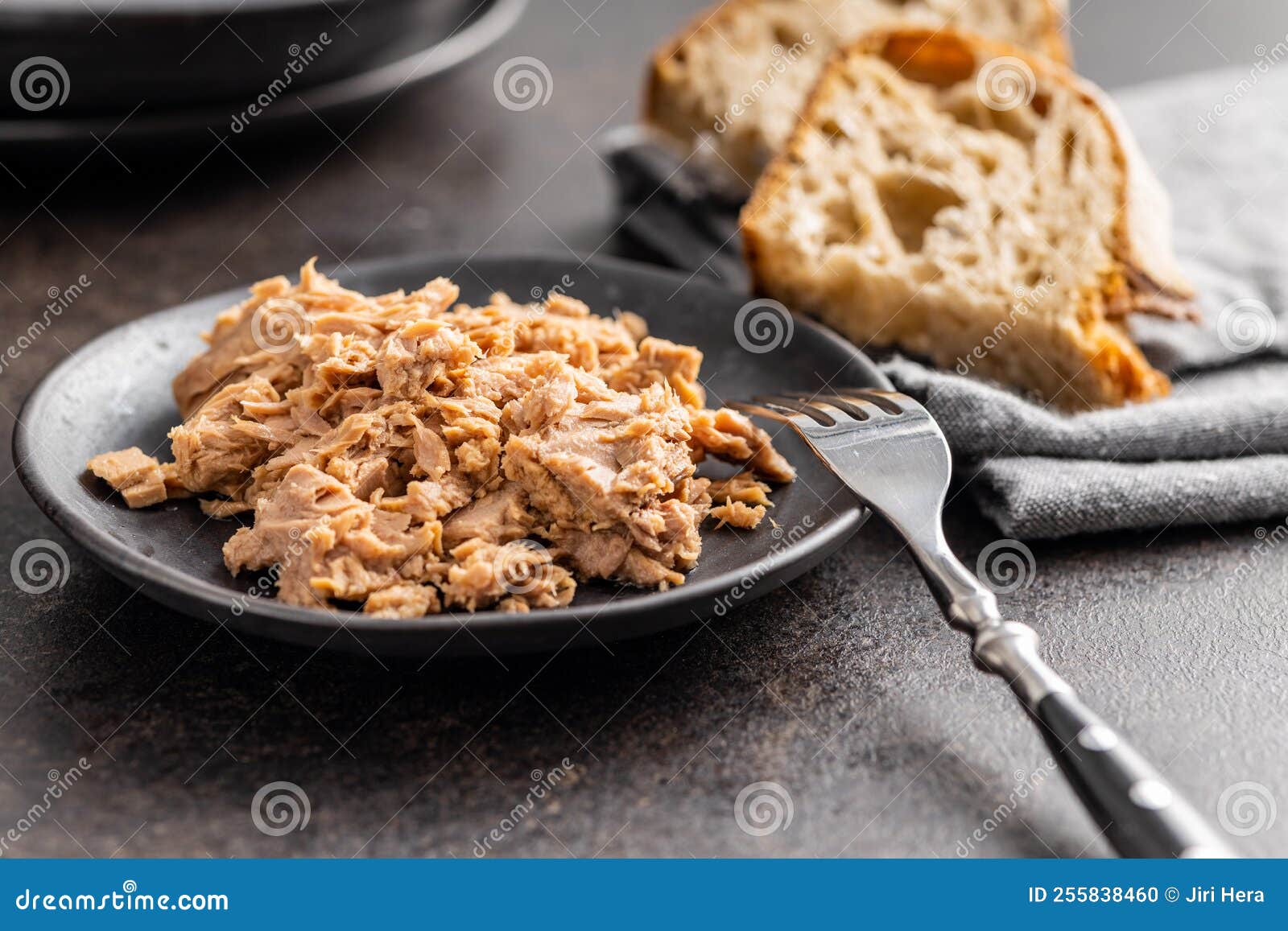 Canned Tuna Fish on the Plate on Black Table Stock Photo - Image of ...