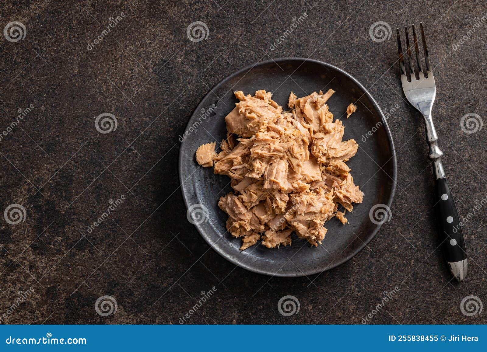 Canned Tuna Fish on the Plate on Black Table Stock Image - Image of ...