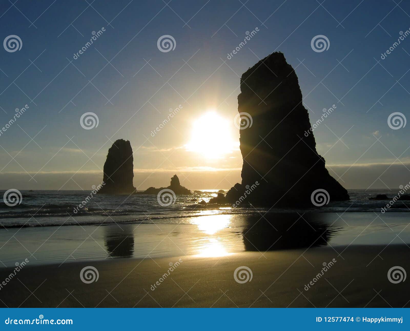 Cannon Beach Sunset stock photo. Image of dusk, boulder - 12577474
