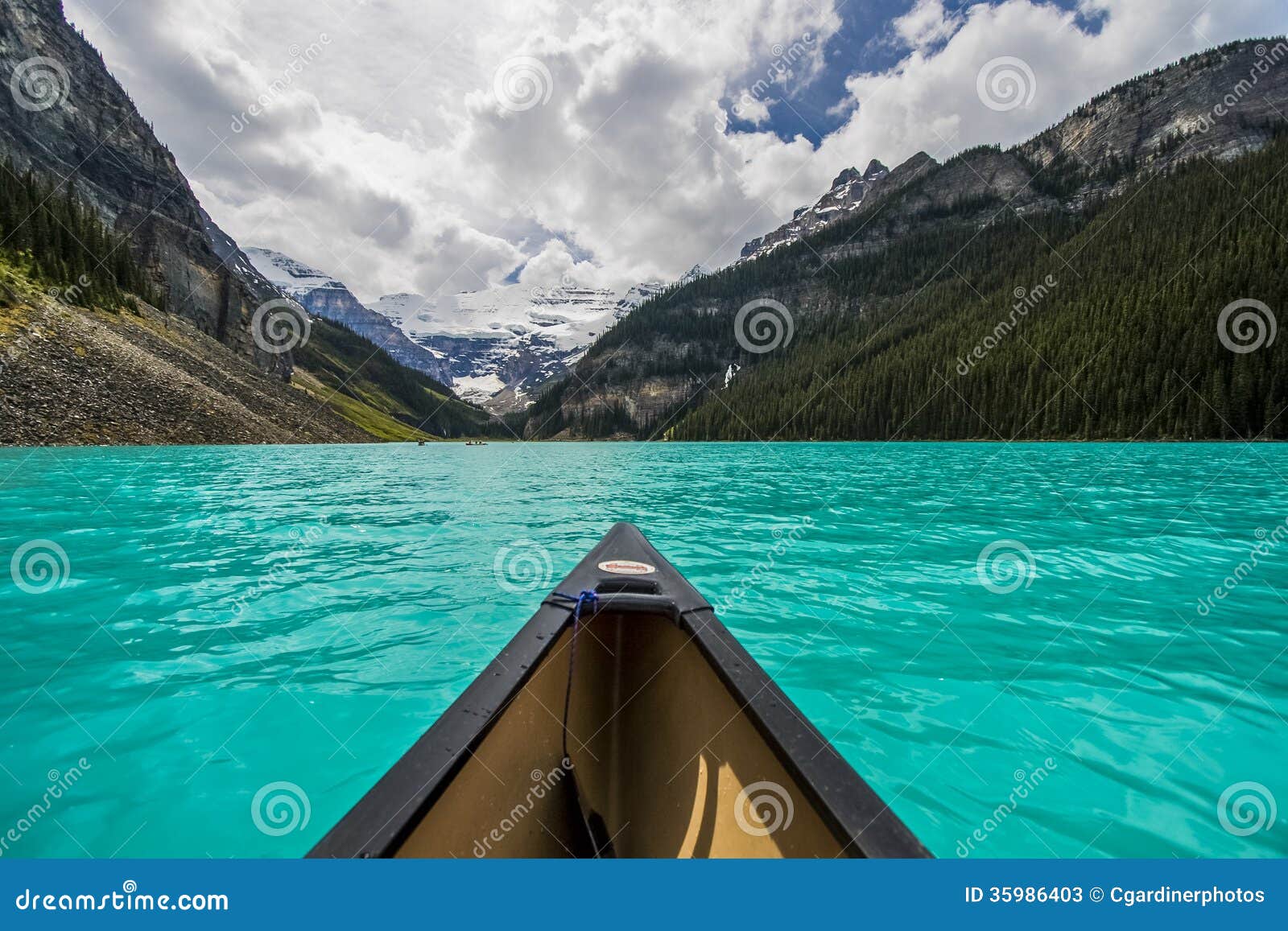 Canoe on Lake Louise stock image. Image of destination - 35986403
