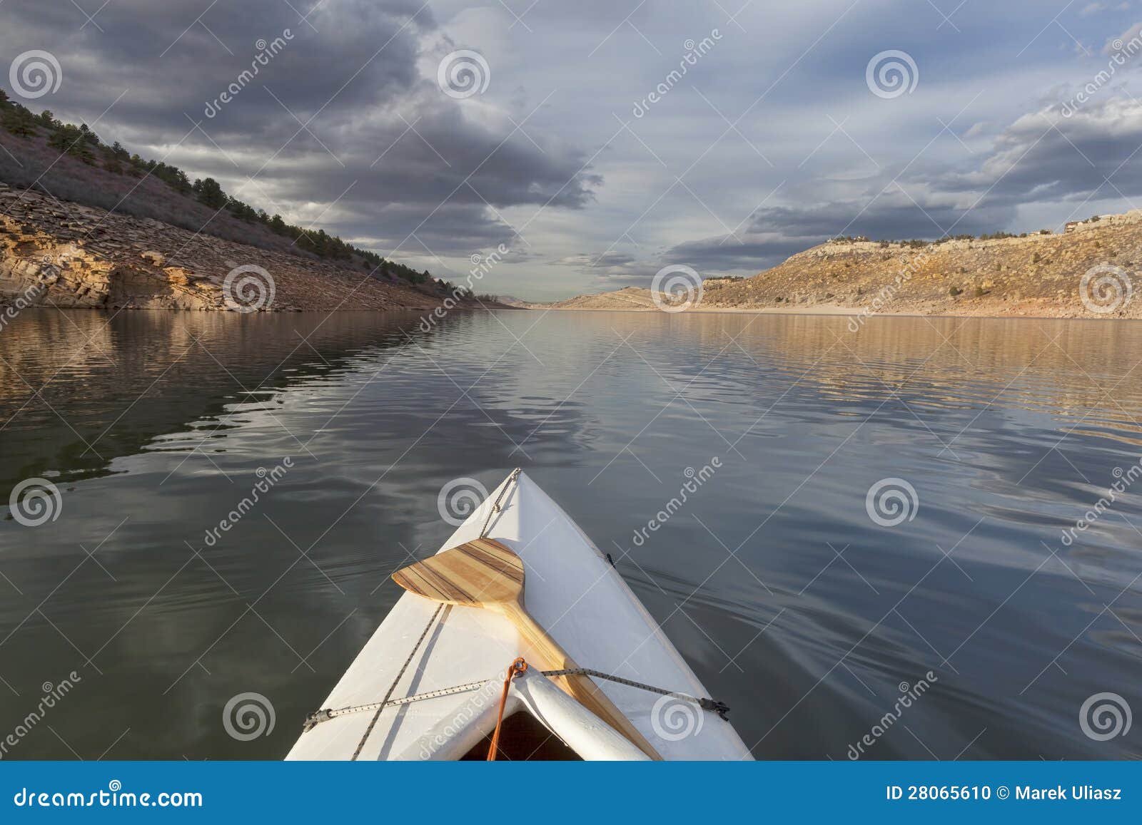 Canoe on mountain lake stock photo. Image of deck, cliff - 28065610