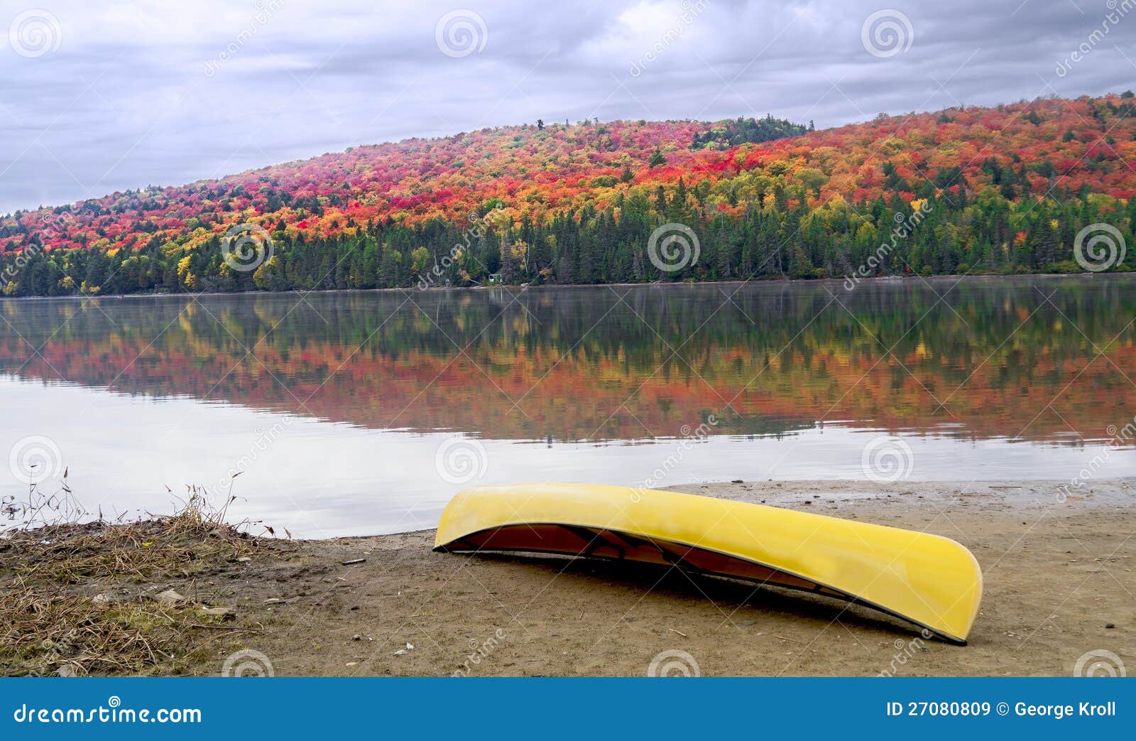 Canoe on Shore with Autumn Colours Stock Image - Image of beach, yellow ...