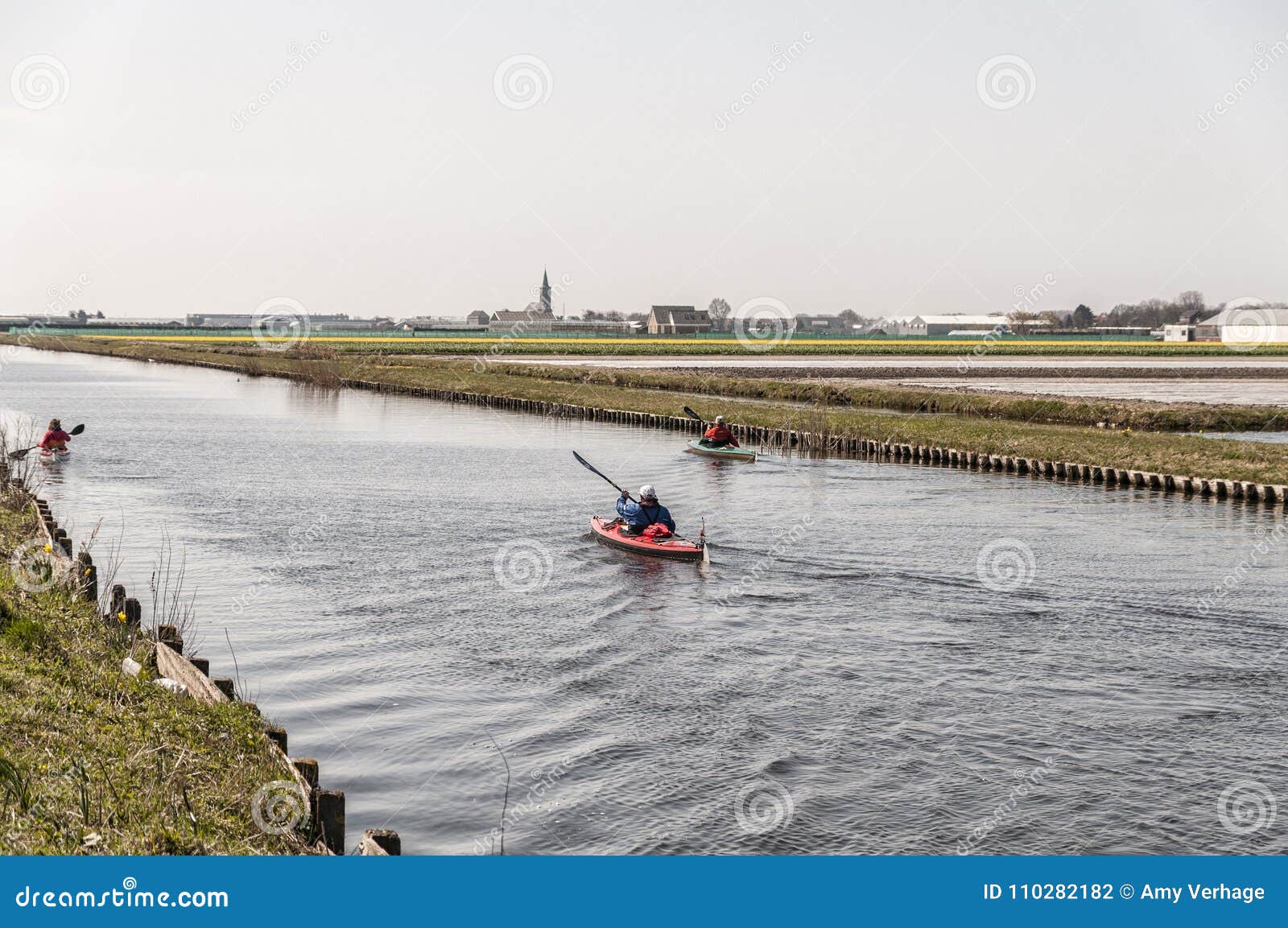 Canoeing on a Dutch river editorial photography. Image of sunset ...