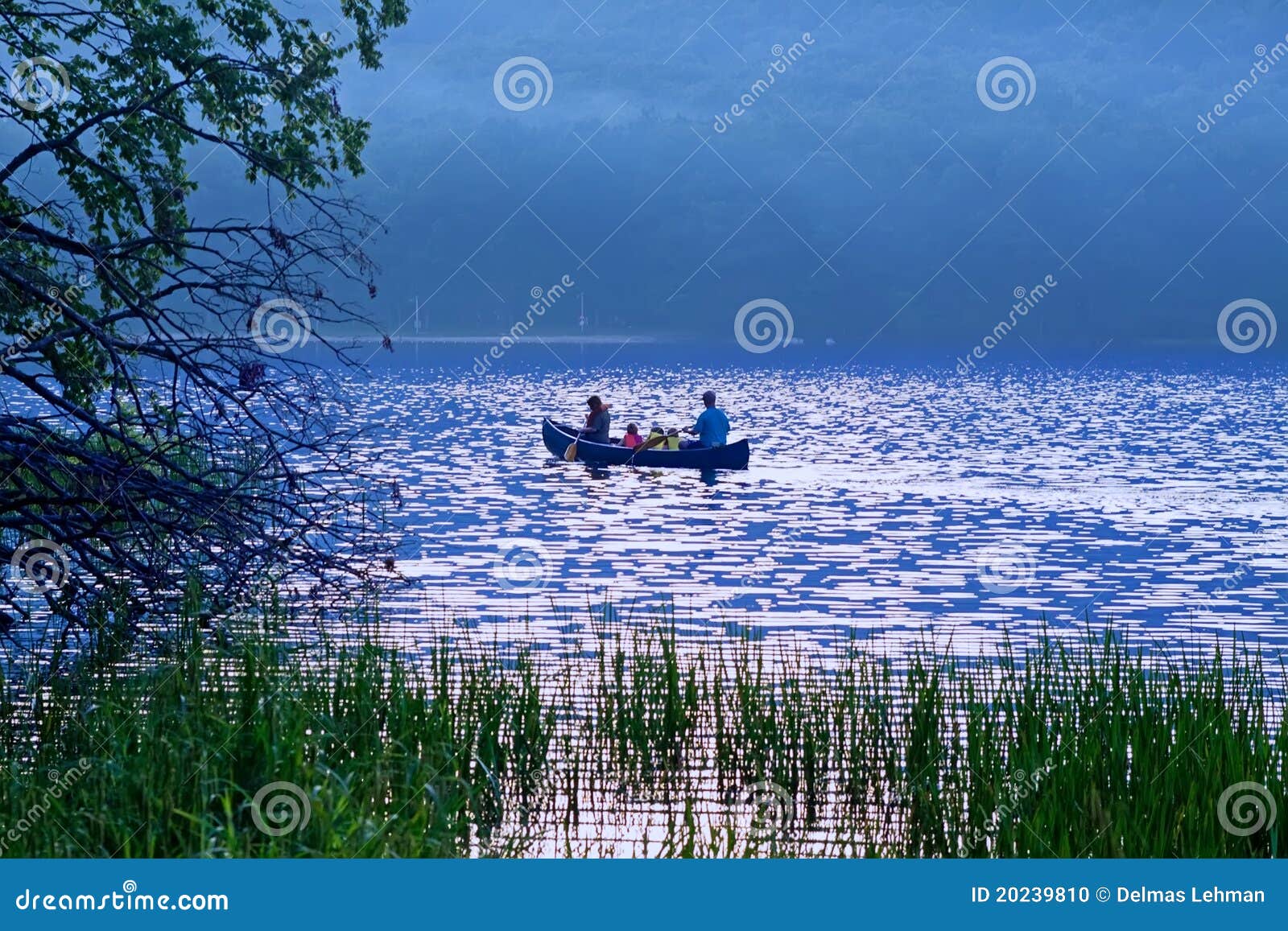 Canoeing in Morning Light stock photo. Image of reflect - 20239810