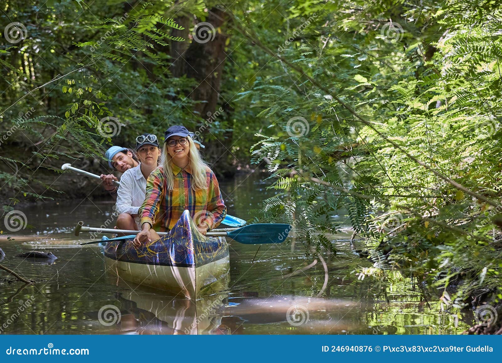 Canoeing in the wild stock photo. Image of idyllic, green - 246940876