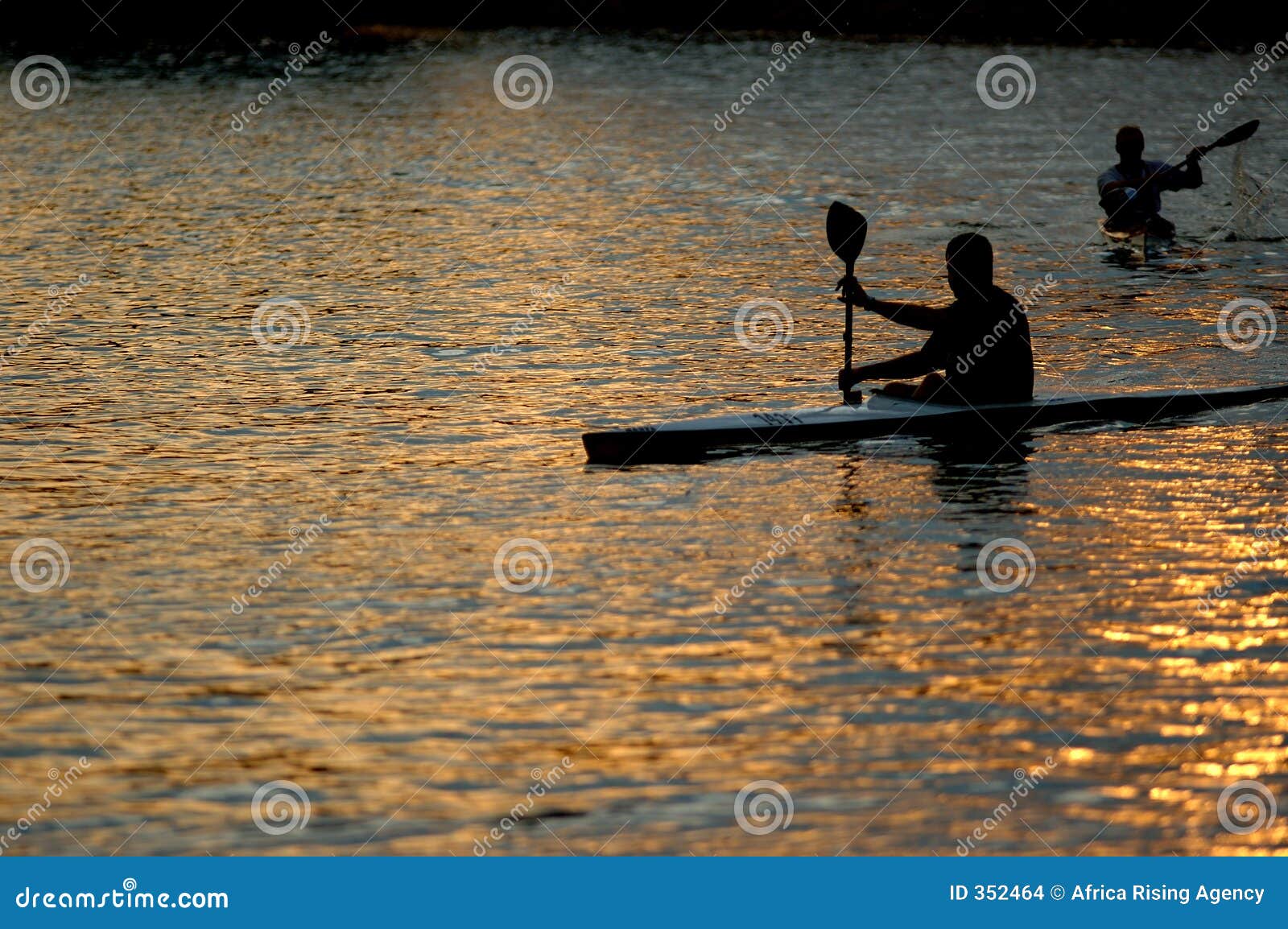 Canoeists paddling on lake stock photo. Image of outside - 352464