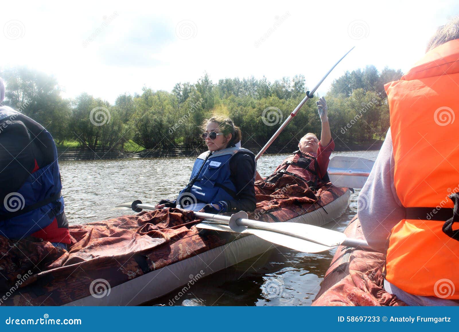 Canoers on the river editorial stock photo. Image of jacket - 58697233