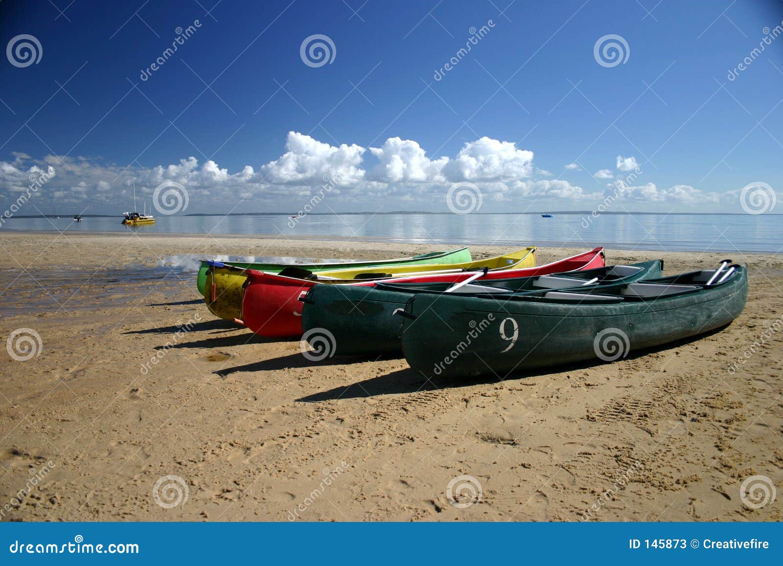 Canoes on Beach stock image. Image of blue, australia, island - 145873