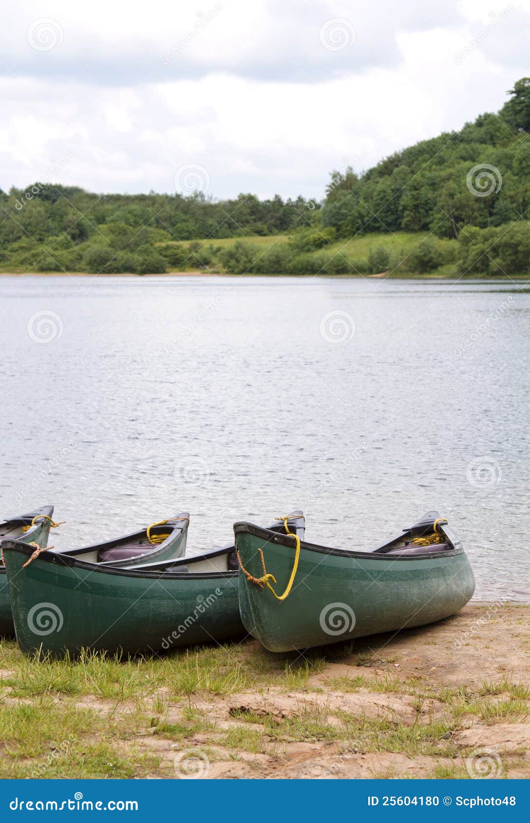 Canoes by shore stock photo. Image of scenery, season - 25604180