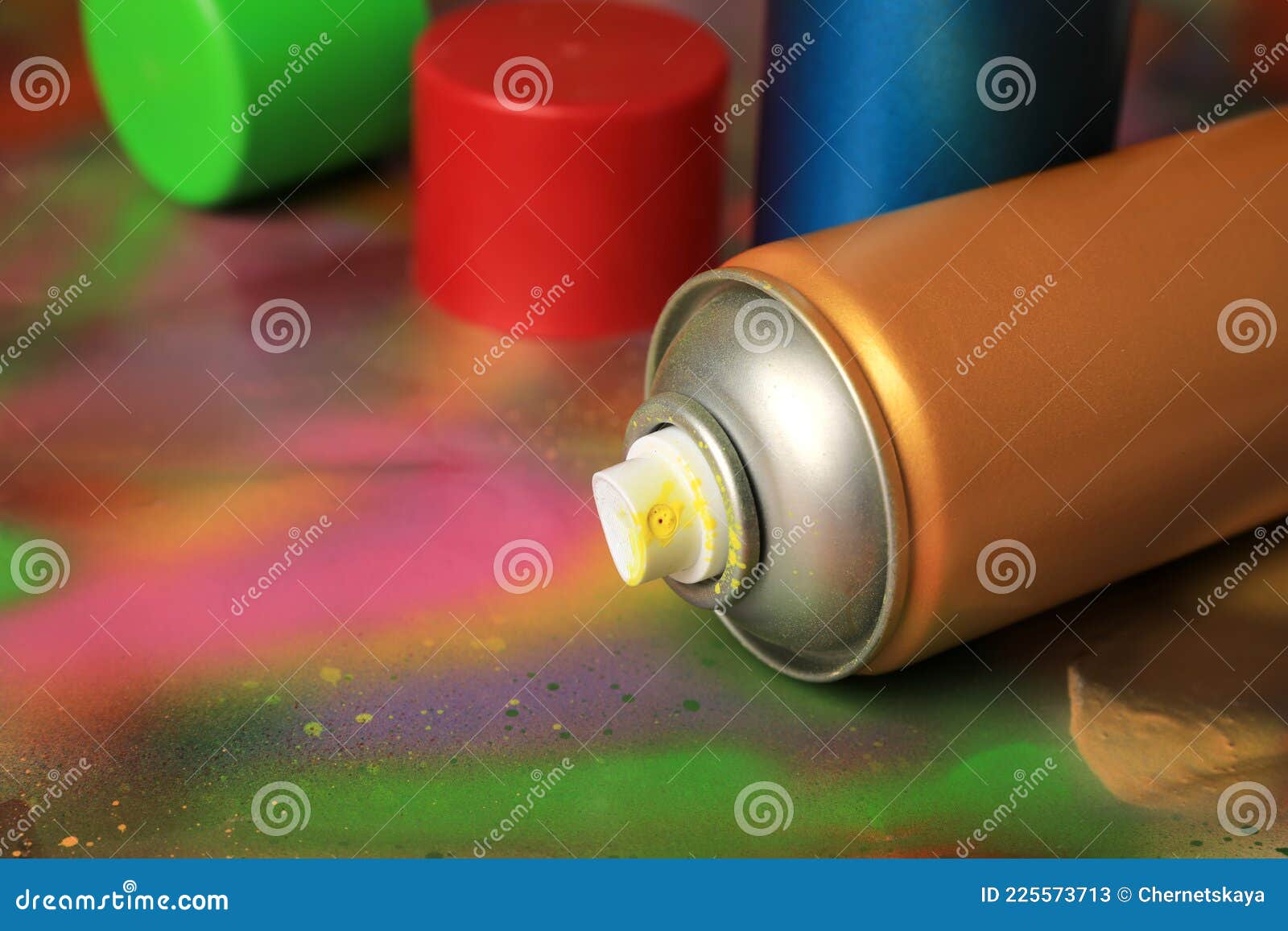 Cans of Different Graffiti Spray Paints on Color Background, Closeup ...