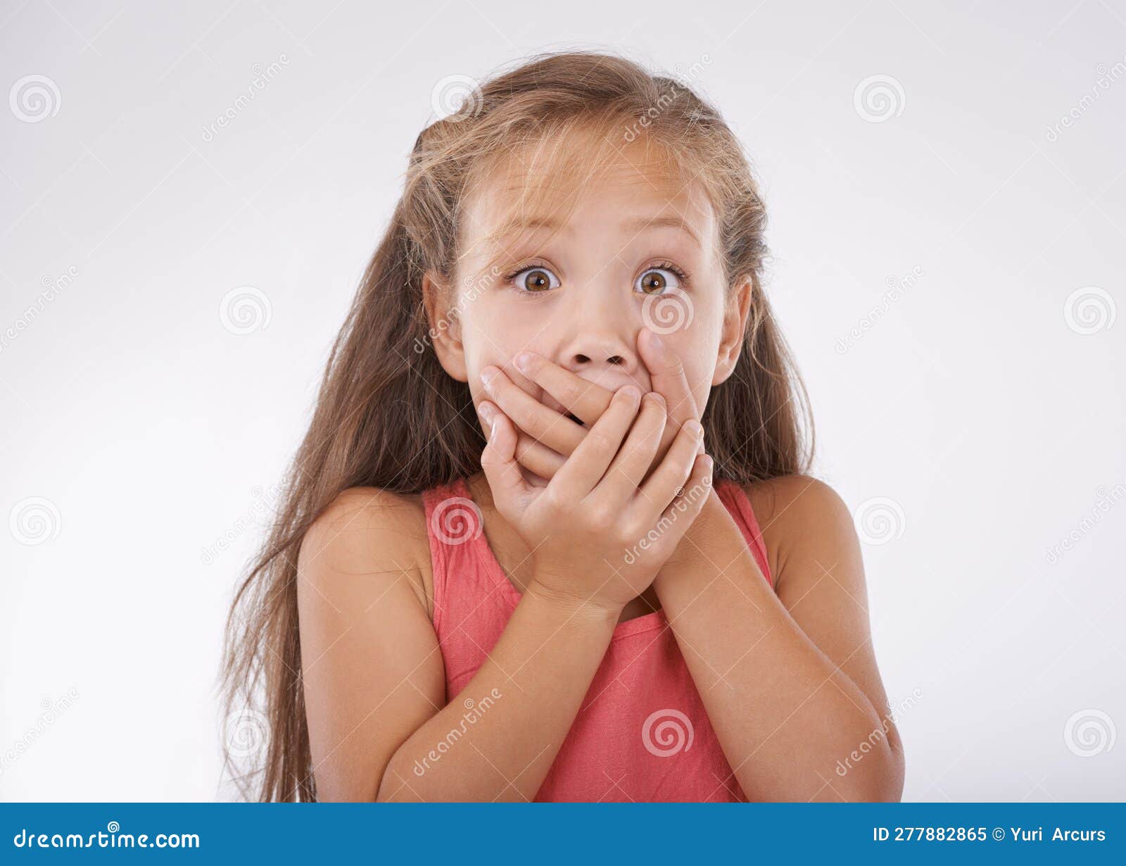 She Cant Believe it. Portrait of a Little Girl Covering Her Mouth in ... She Cant Believe it. Portrait of a Little Girl Covering Her Mouth in ...