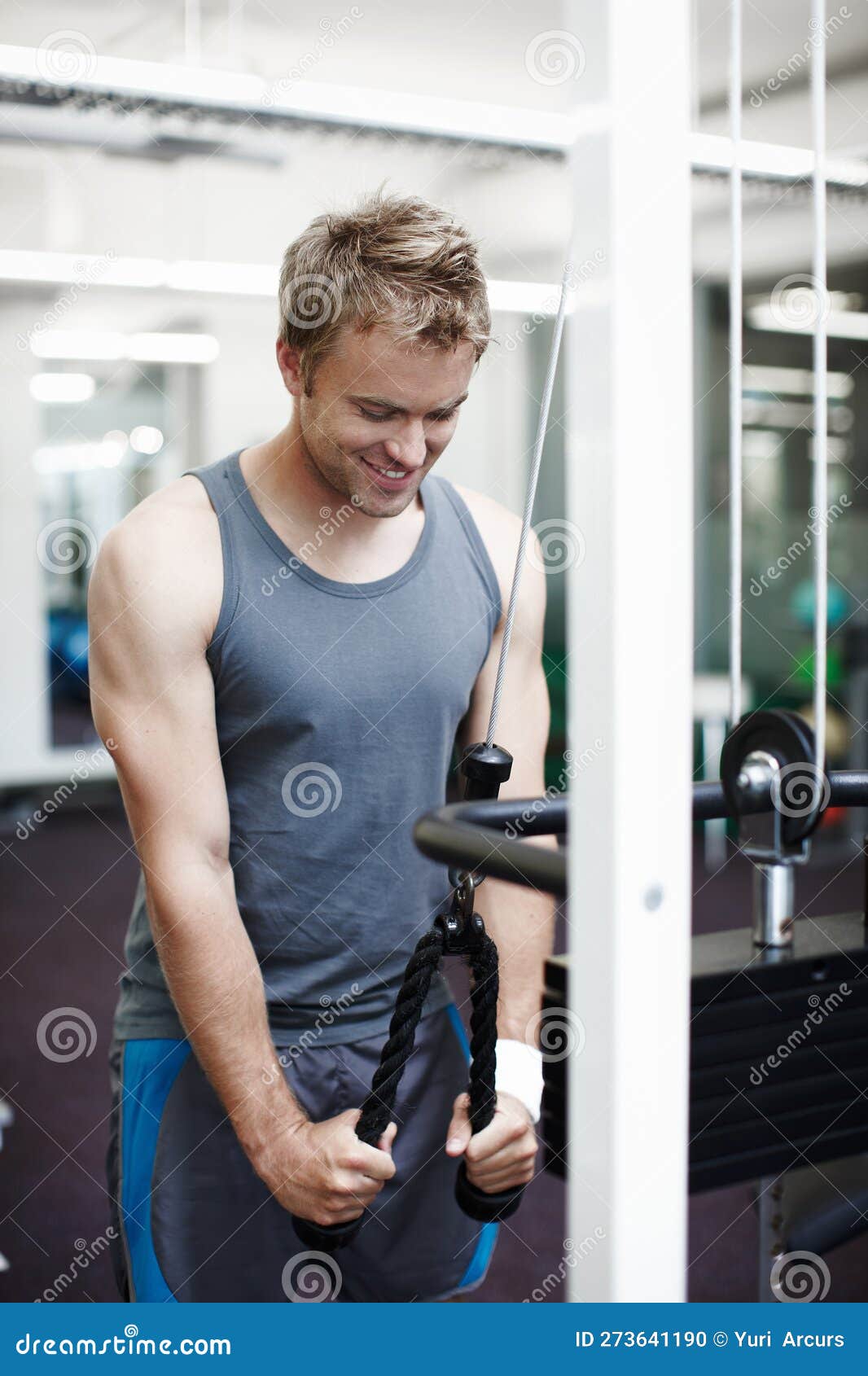 Cant Forget the Triceps. a Handsome Young Man Exercising in the Gym ...