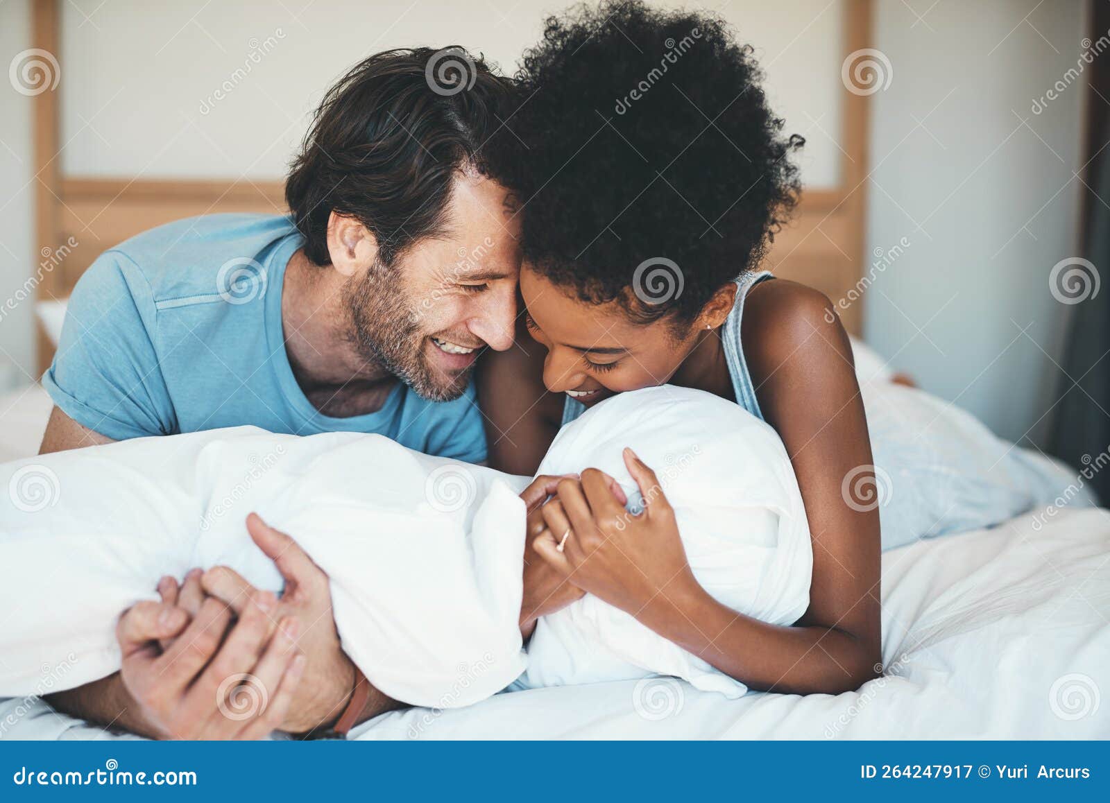 They Cant Get Enough Of Being Around Each Other An Affectionate Young Couple Smiling While