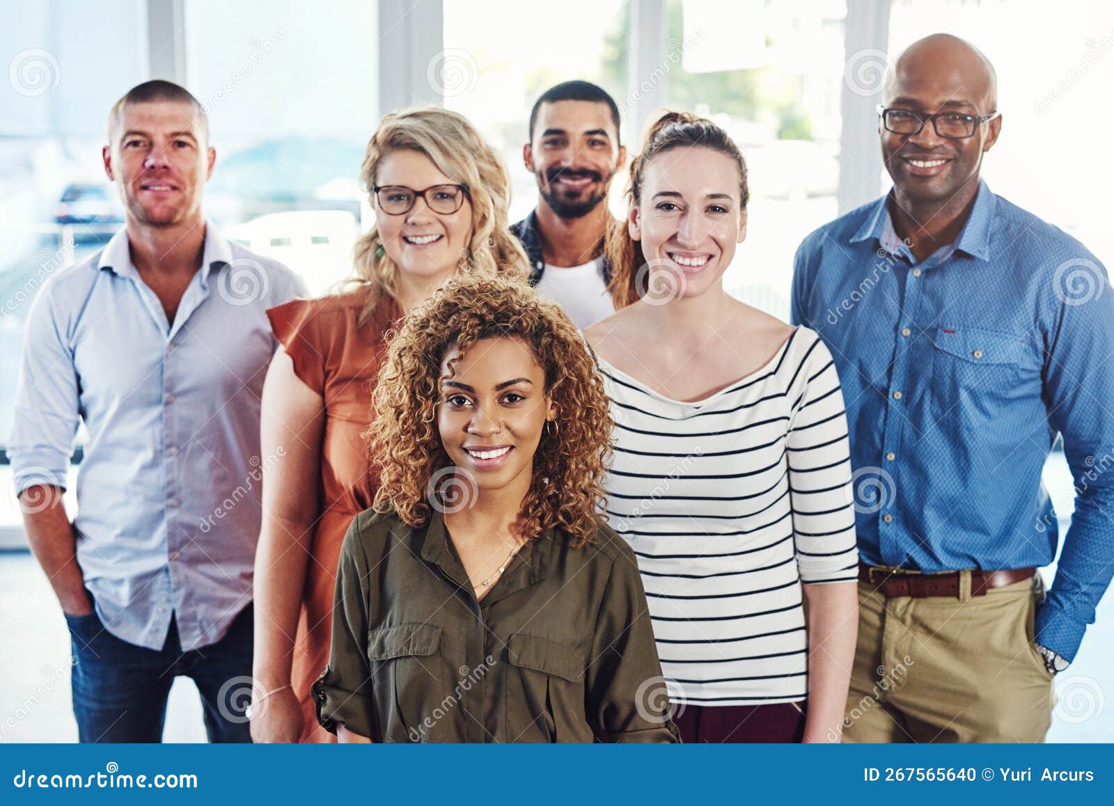 Cant Help but Feel Optimistic. Portrait of a Group of People Standing ...