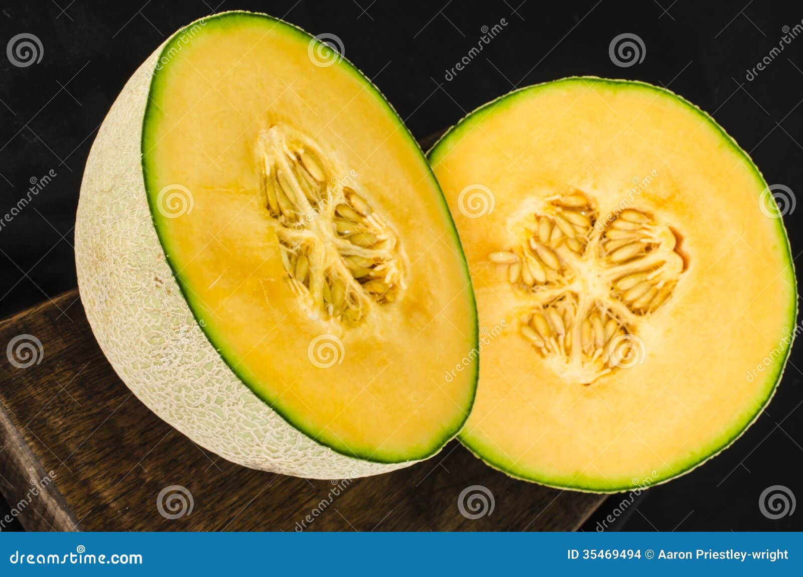 Cantaloup Melon Cut in Half Stock Photo - Image of melon, seeds: 35469494