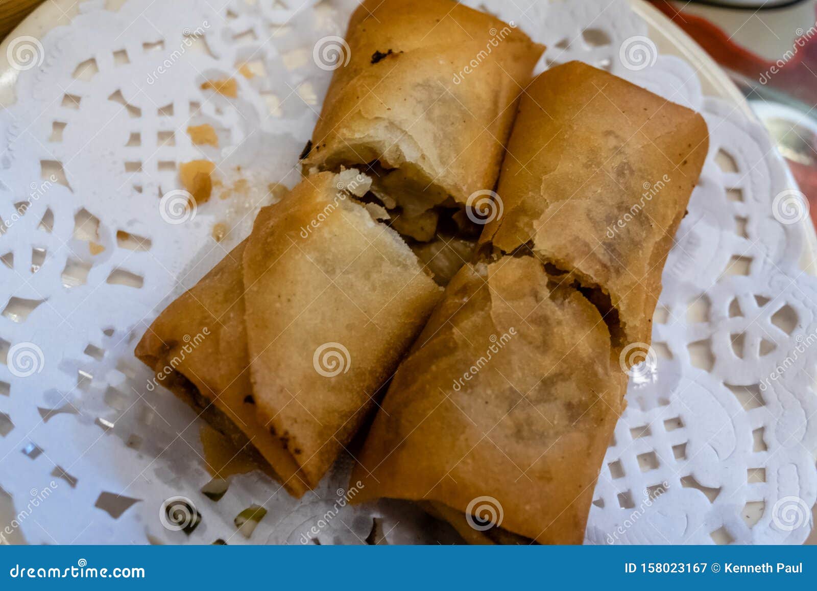 Spring Rolls in a Plate in Front of Bamboo Steamers Stock Image - Image ...