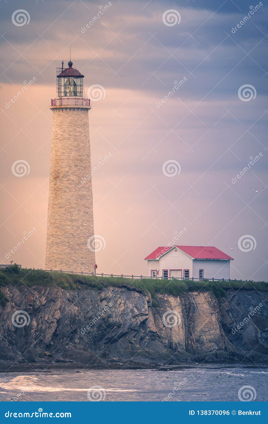 Cap-des-Rosiers Lighthouse With Full Moon In The Background. Stock ...