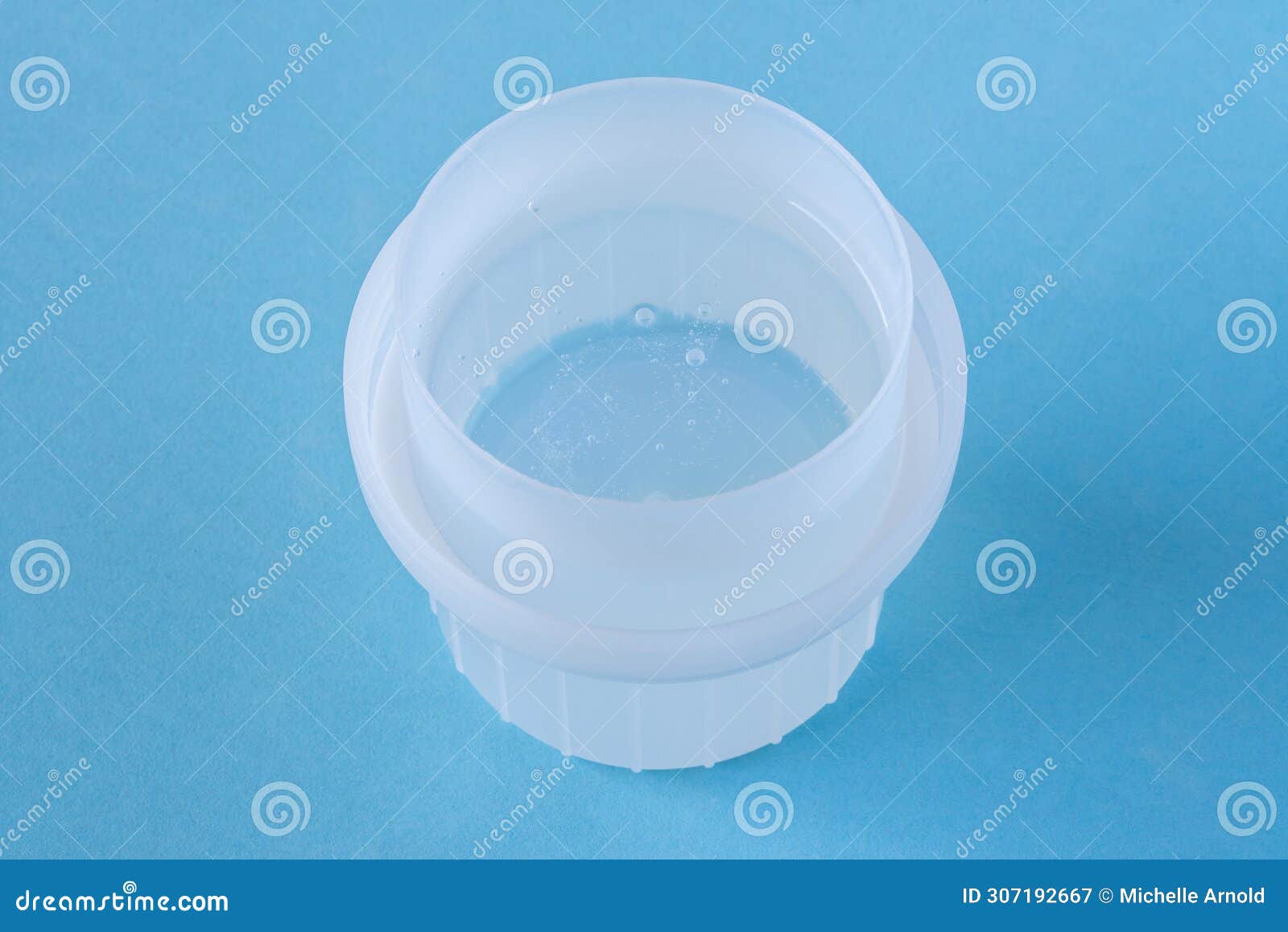 A Cap Full of Eco Friendly Laundry Detergent Stock Image - Image of ...