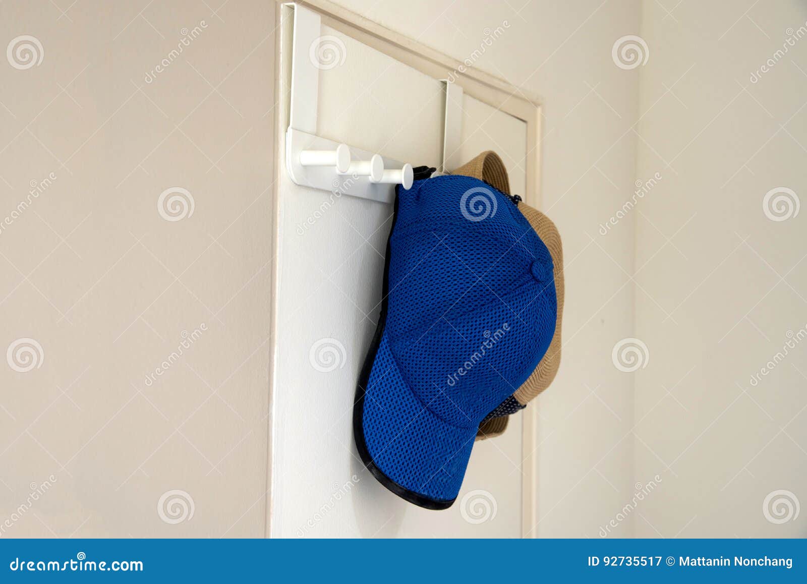 Cap and hat hang on wall stock image. Image of black - 92735517
