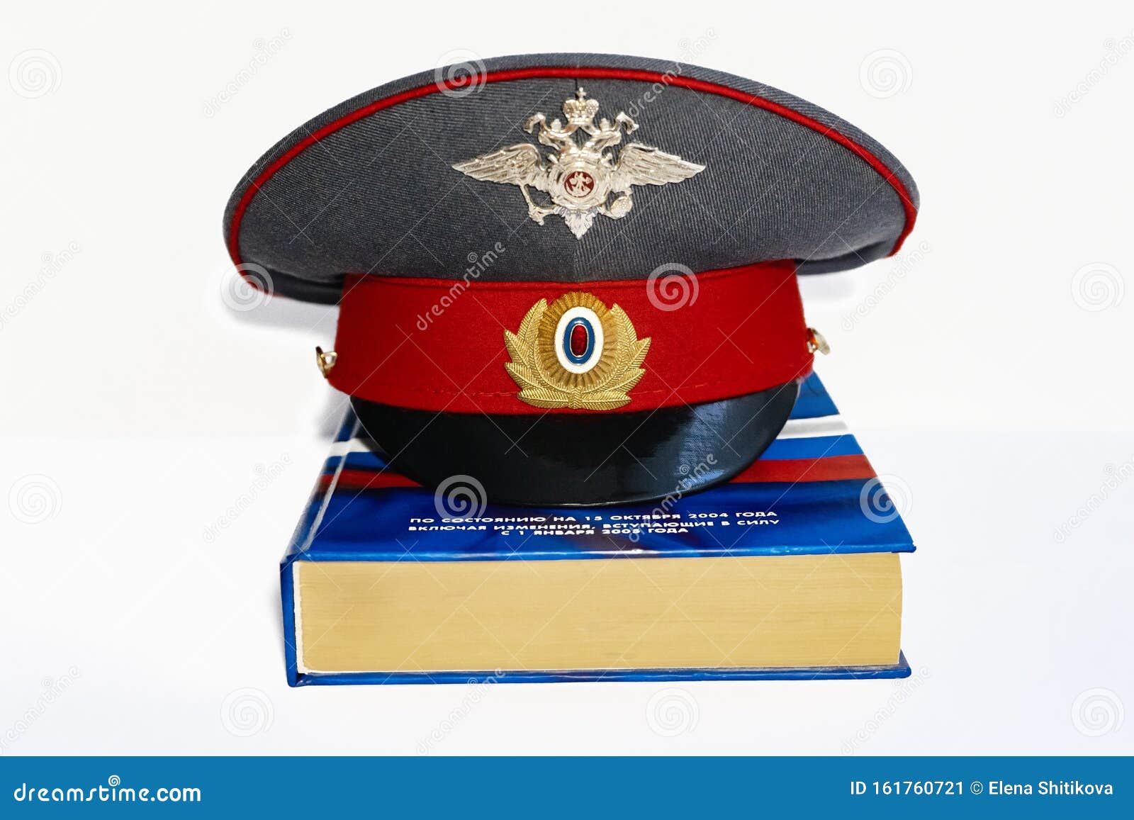 The Cap of a Russian Police Officer and a Rubber Baton is on the Code ...