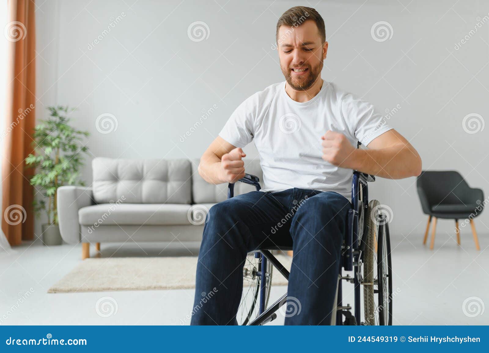 Capable Disabled Trying To Get Up from the Wheelchair. Stock Image ...
