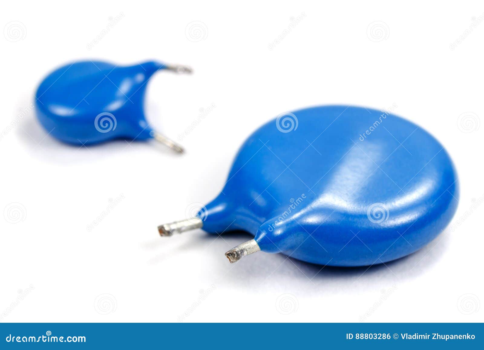 Capacitors in Cases of Blue Color on a White Background Stock Photo ...