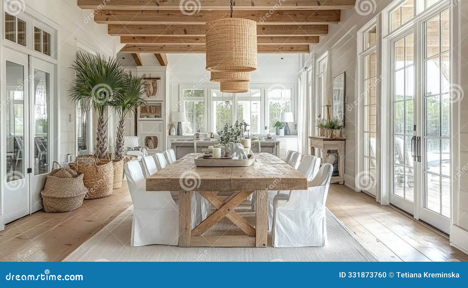 Cape Cod Dining Room with Large Wooden Table, White Chairs, and ...