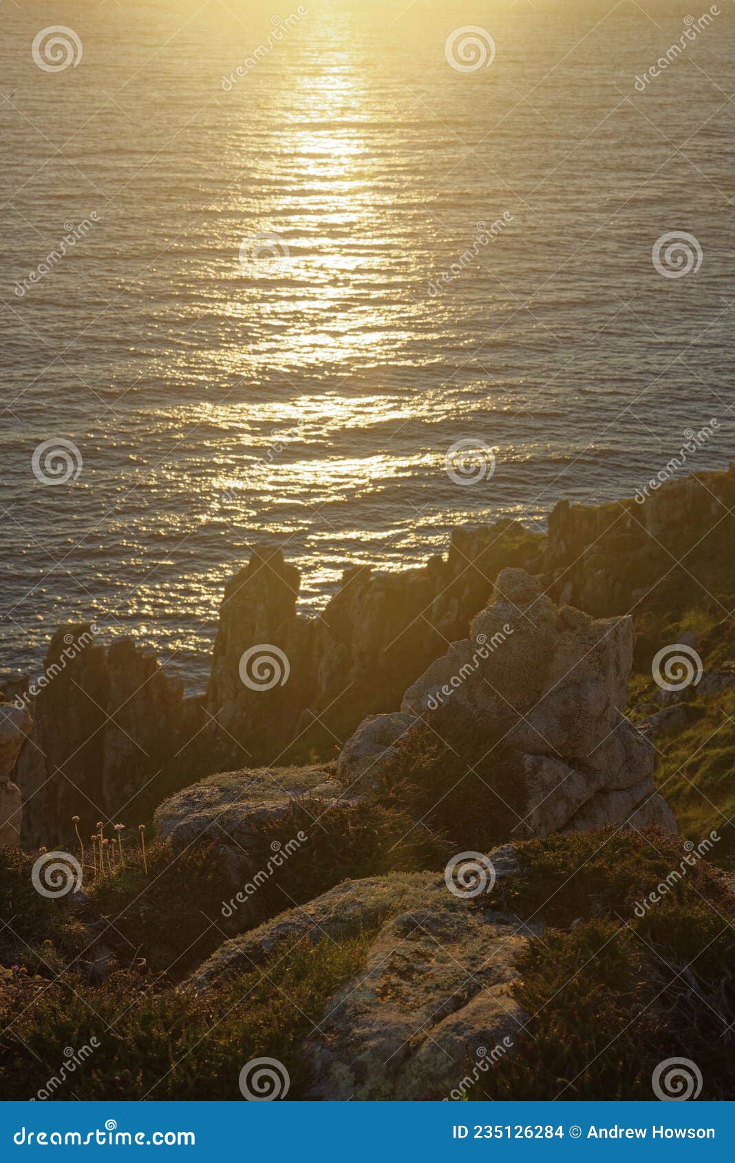 Cape Cornwall at sunset stock photo. Image of glows - 235126284