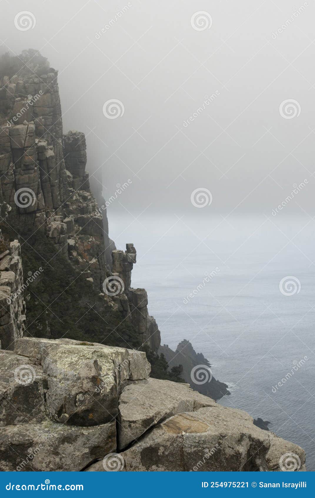Cape pillar cliff face stock image. Image of cloudy - 254975221