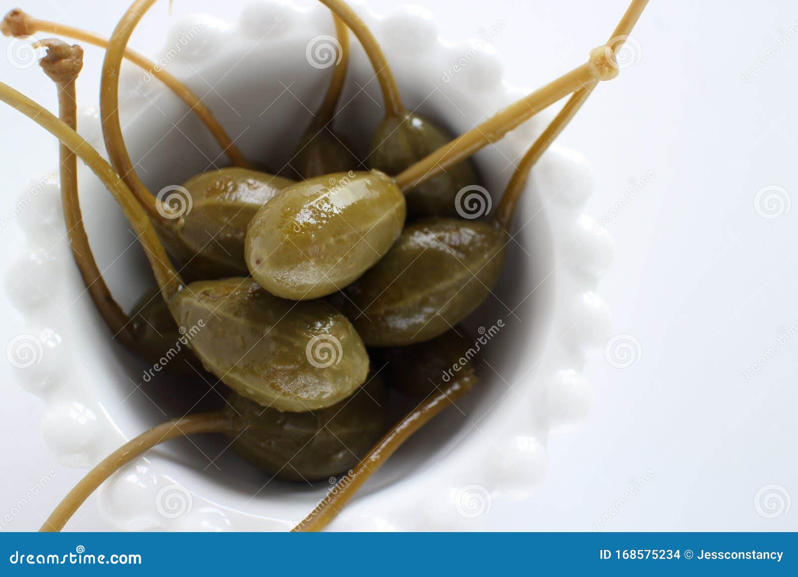 Caperberry Picked Fruit in White Bowl Stock Photo - Image of green ...