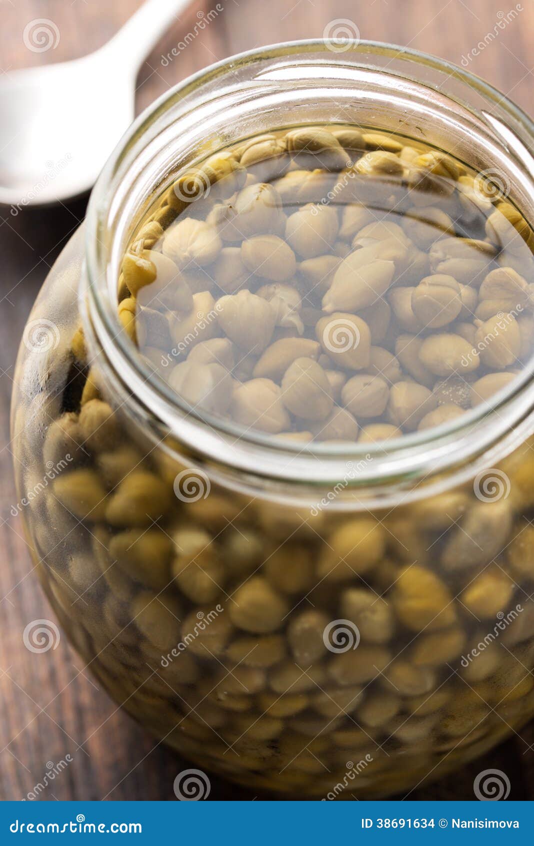 Capers in Glass Jar on Wooden Background Stock Photo - Image of healthy ...