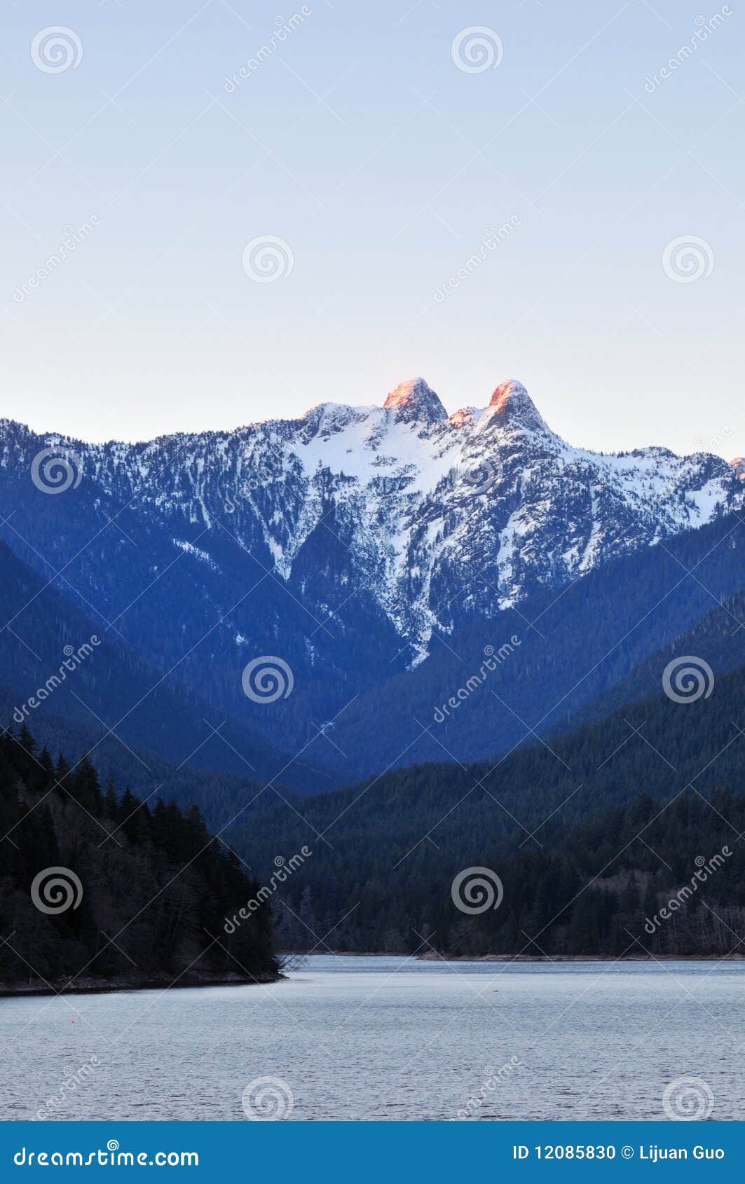 Capilano River and the Lions Mountain Stock Photo - Image of snow, peak ...