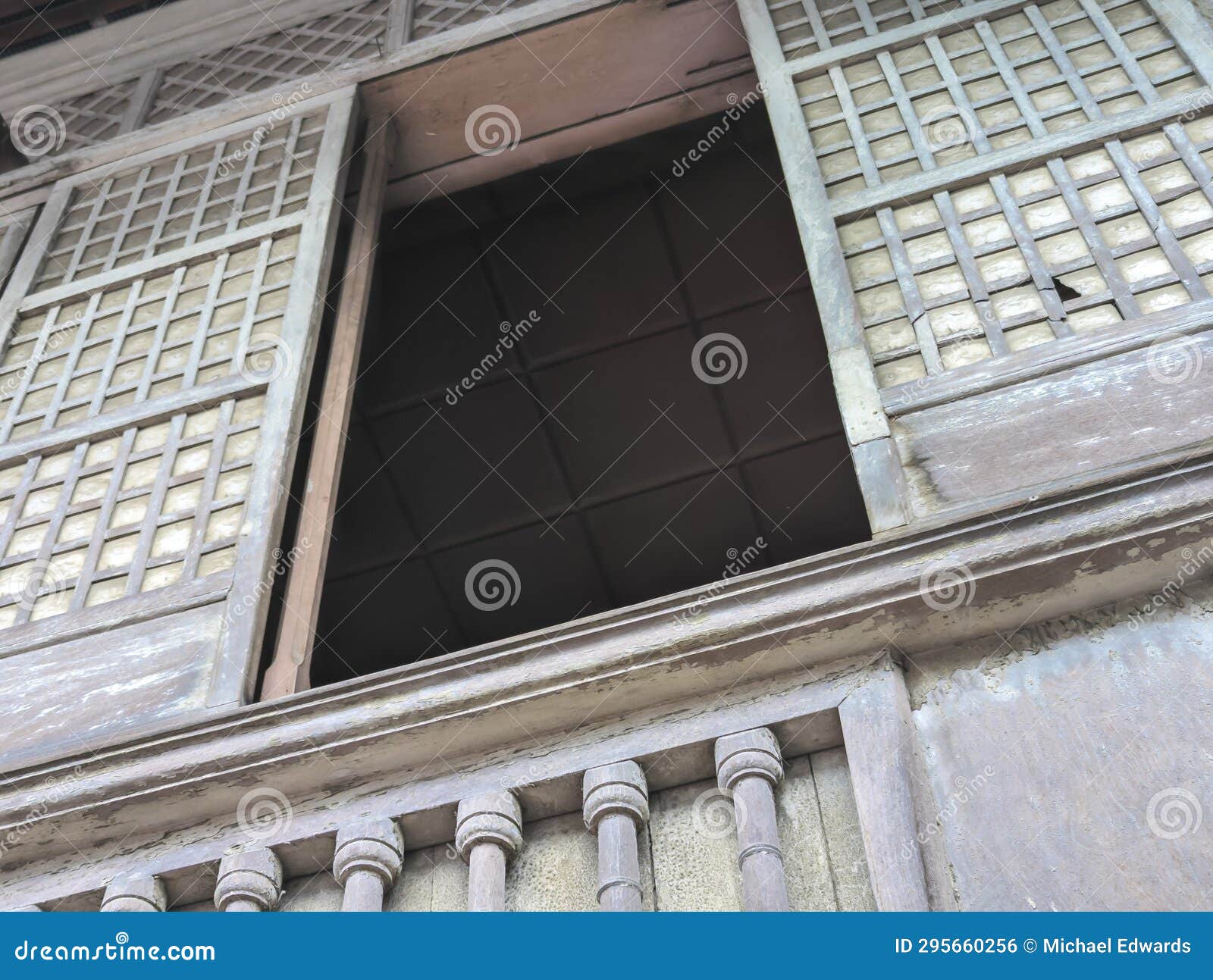 The Capiz Window Shutters of an Old Spanish Colonial House Stock Photo ...