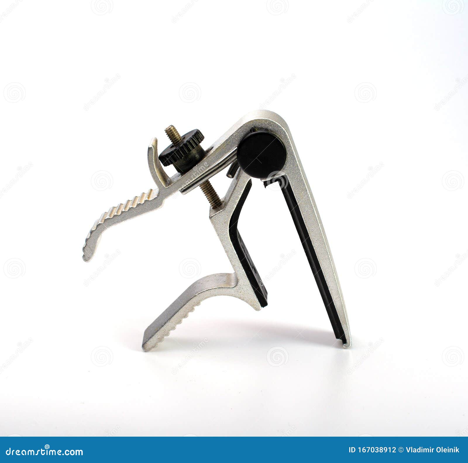 Capo Clip for Guitar Strings Isolate Stock Photo - Image of isolated ...