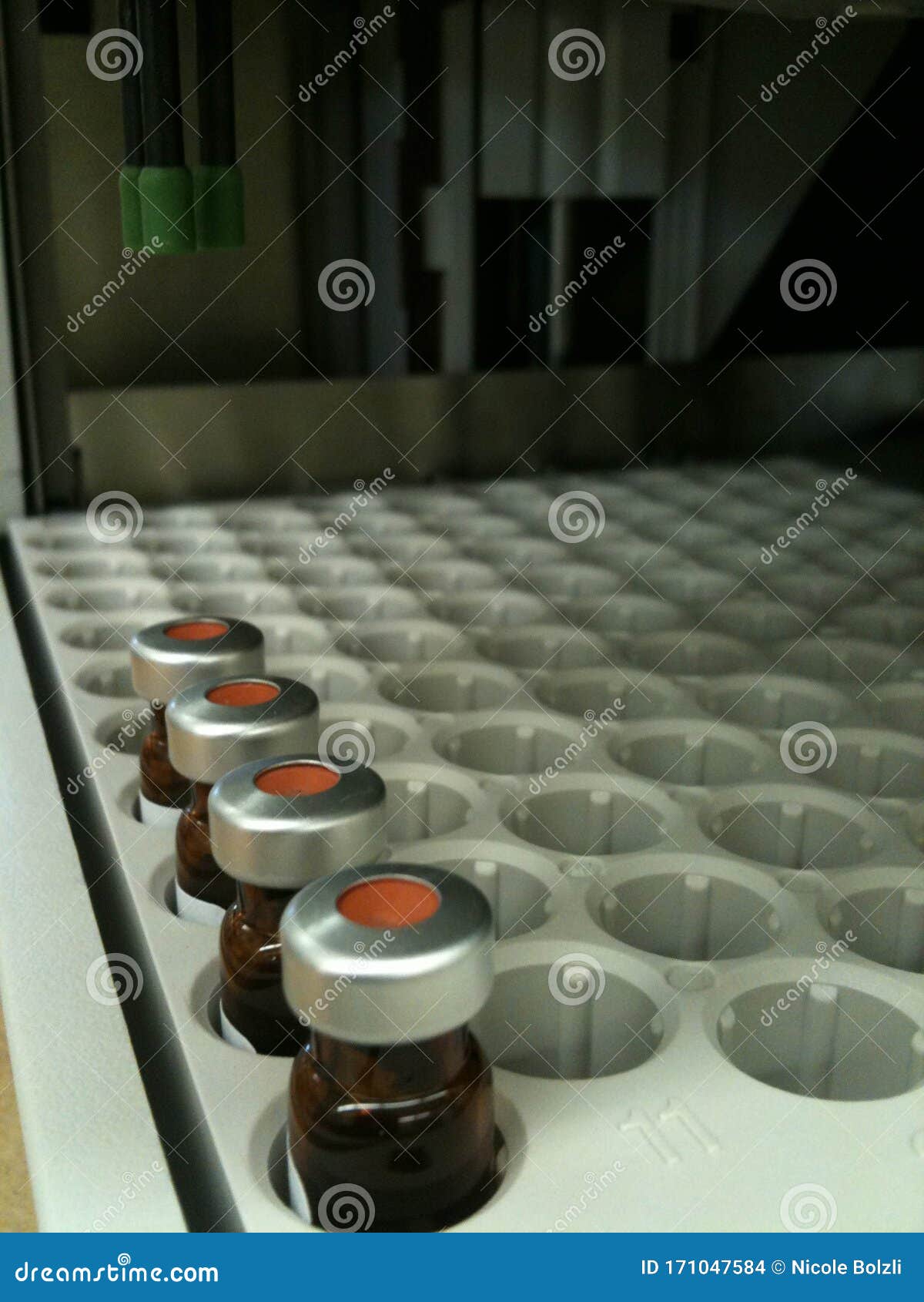 Capped Sample Vials on an HPLC Analysis Autosampler Stock Photo - Image ...