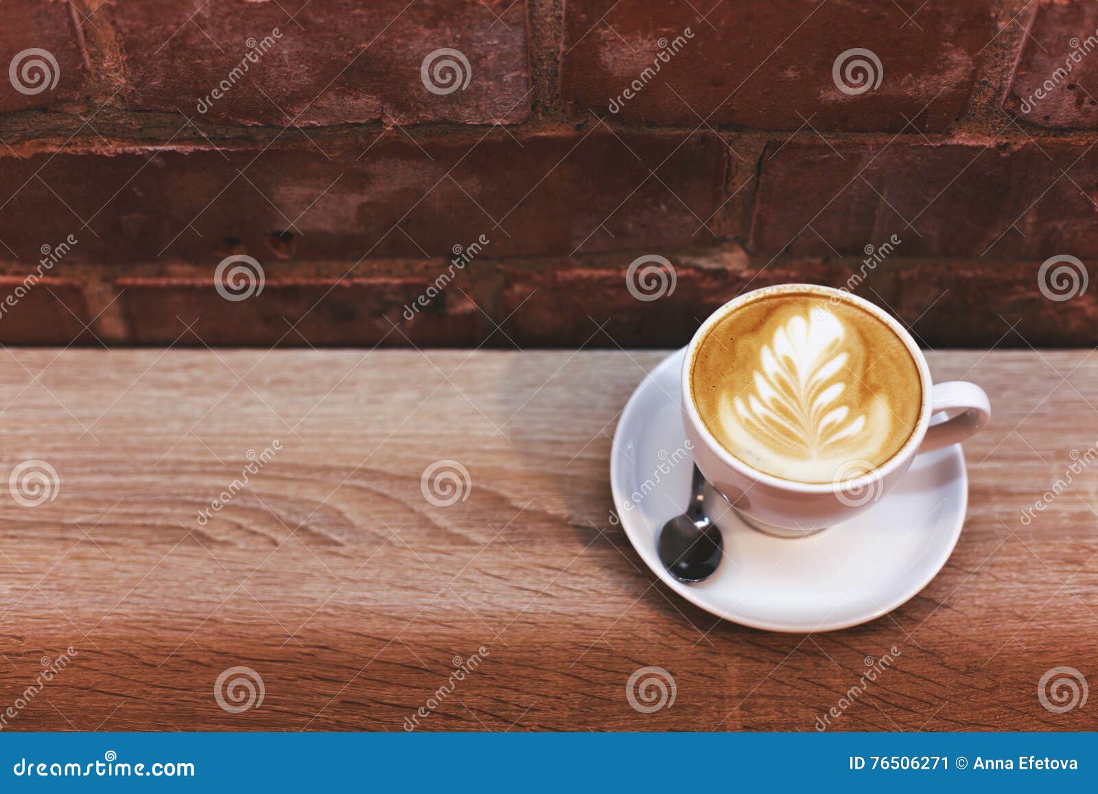 Cappuccino on the Table Near Brick Wall Stock Image - Image of espresso ...