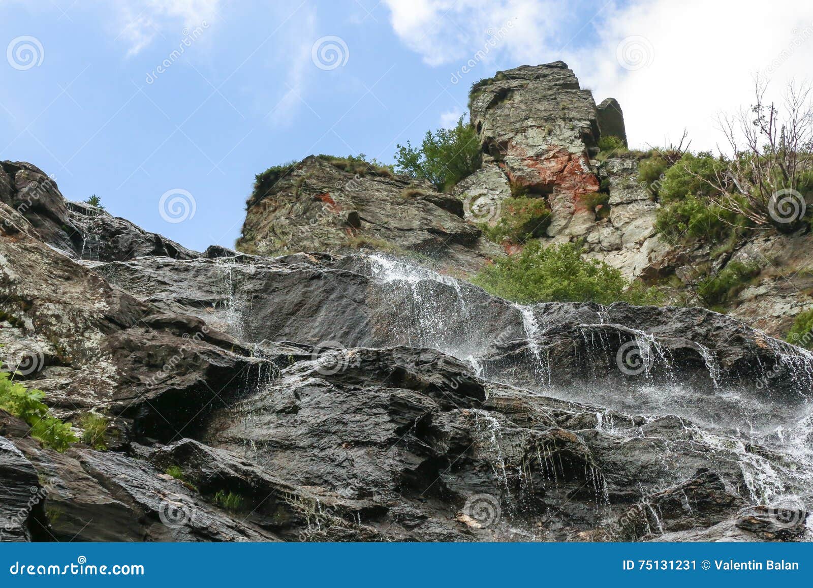 Capra waterfall stock image. Image of clouds, river, water - 75131231