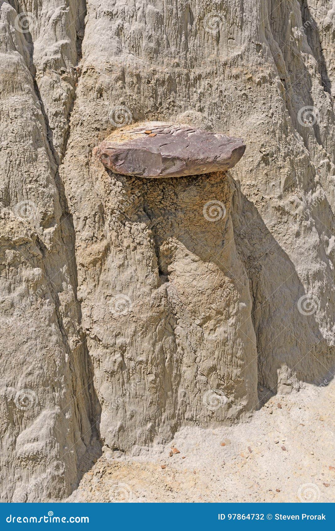 Caprock on Eroding Mudstone Stock Photo - Image of details, geology ...