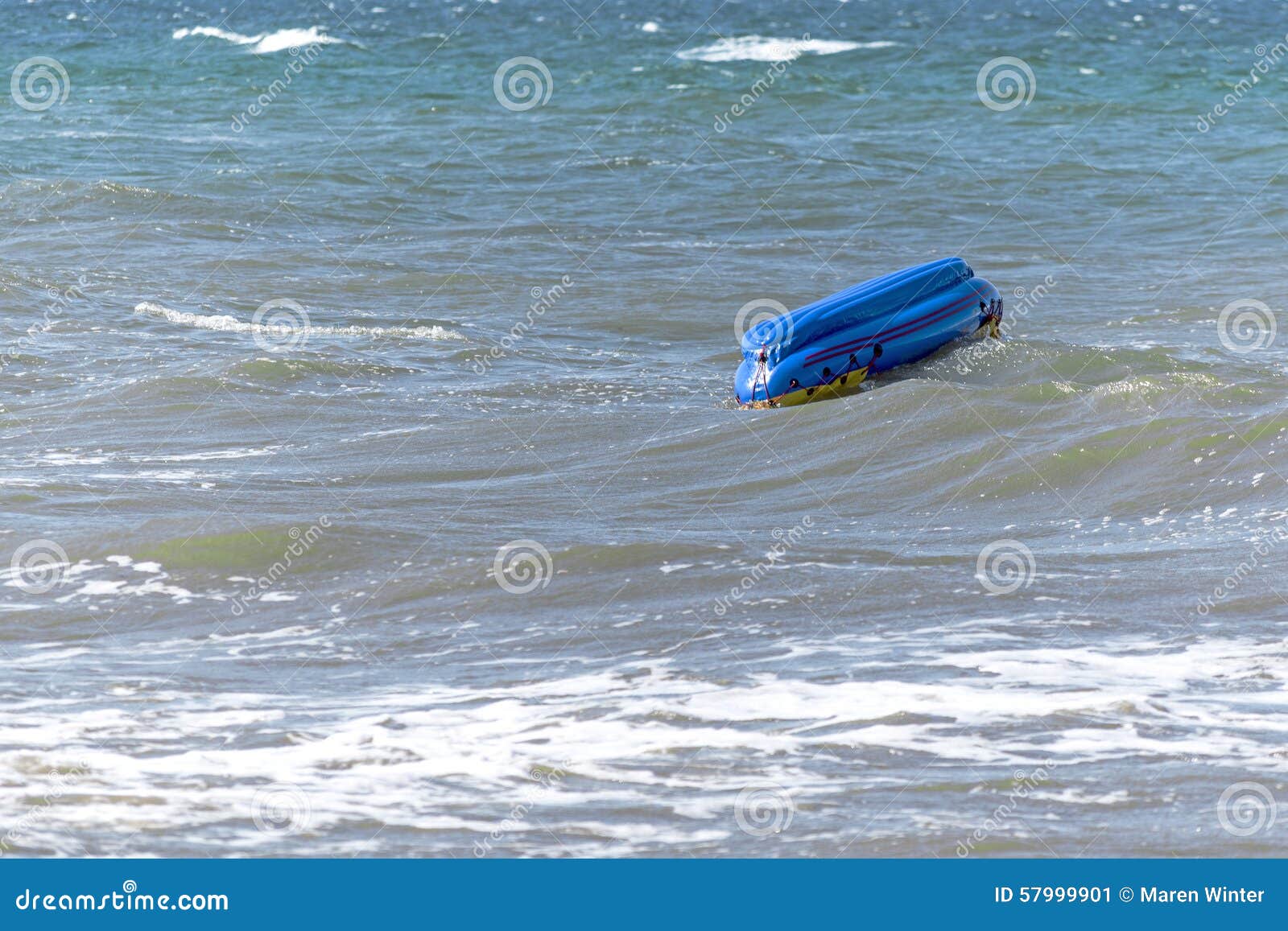 Capsized Inflatable Boat in the Sea Stock Image - Image of inflatable ...