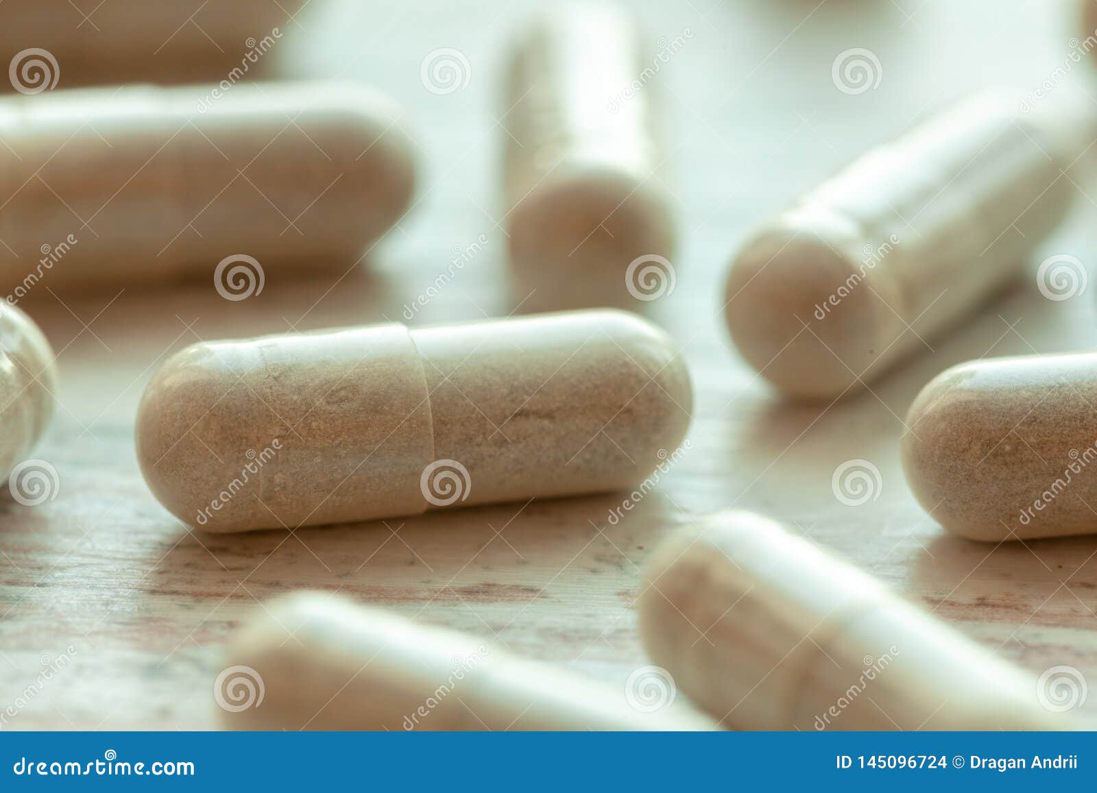 Capsule from Natural Herbs, Pill on the Table, Macro. Stock Photo ...