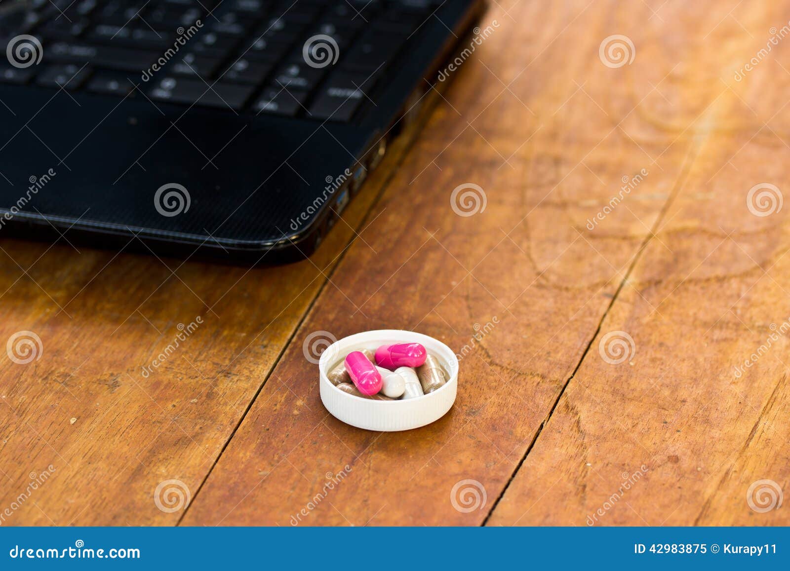 Capsule and Notebooks on Wood Table. Stock Image - Image of black ...