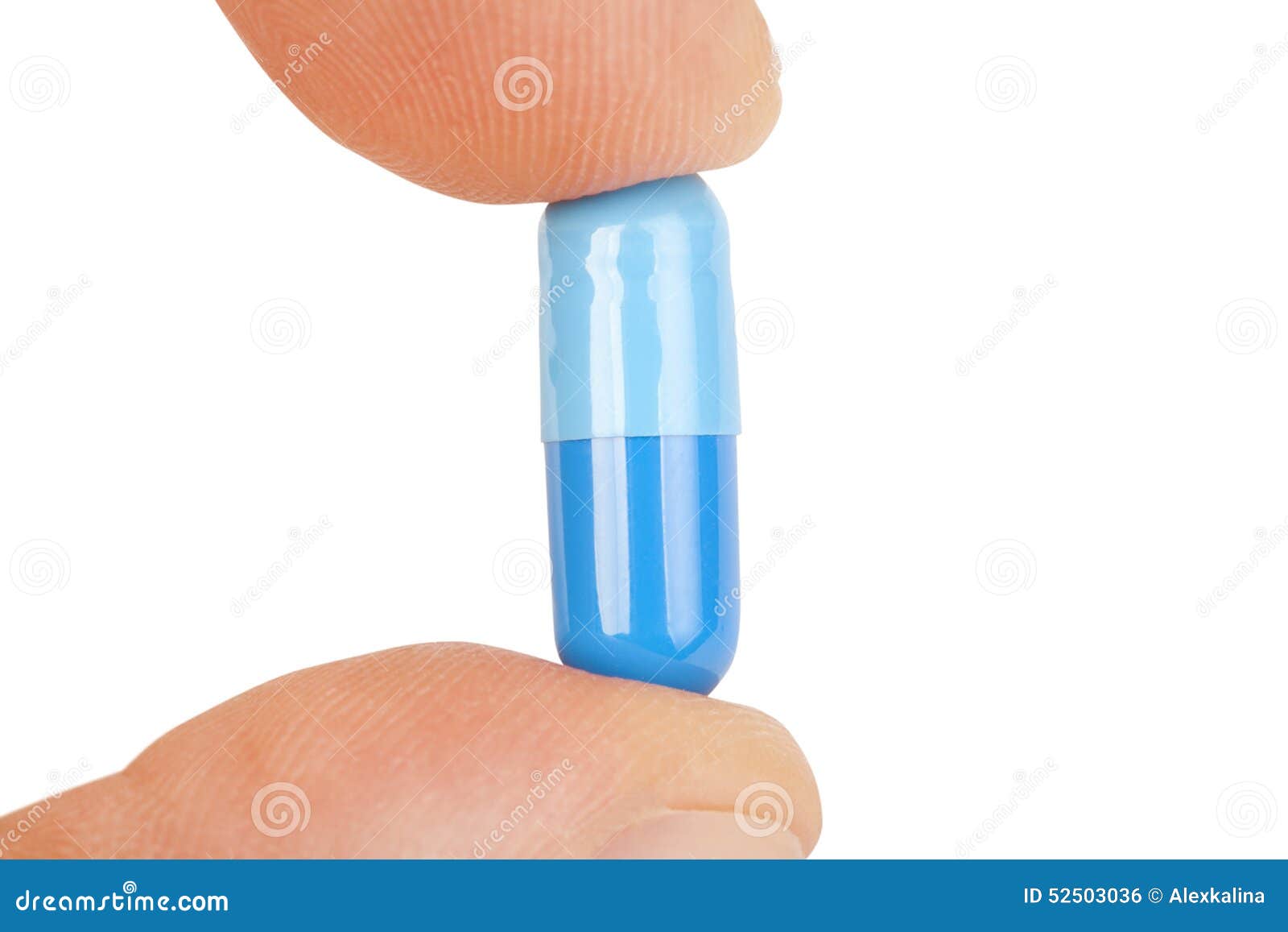 Capsule pills in fingers stock photo. Image of aspirin - 52503036