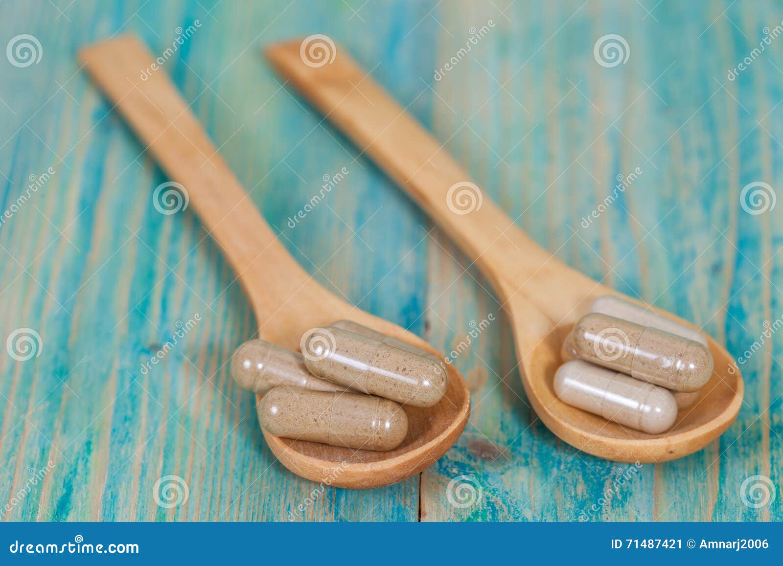 Capsules of Herbs on Spoon. Eating for Healthy Living. Stock Image ...